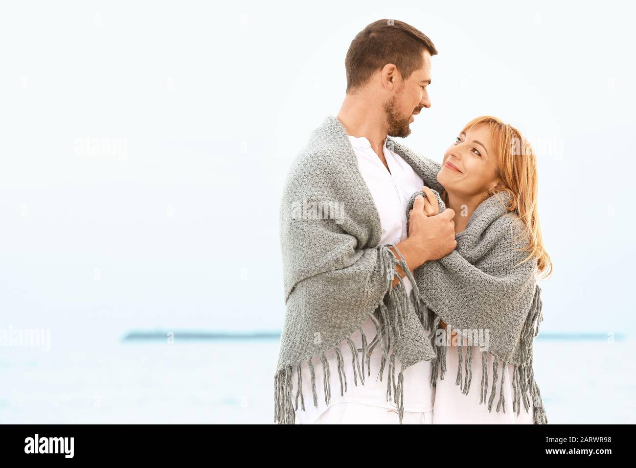 Happy couple resting at sea resort Stock Photo - Alamy