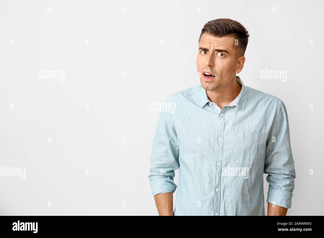 Suspicious, mistrust, face hi-res stock photography and images - Alamy