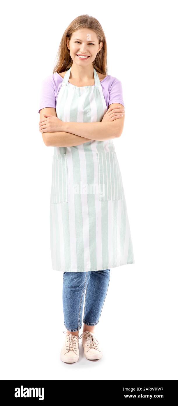 Beautiful young woman in apron on white background Stock Photo - Alamy