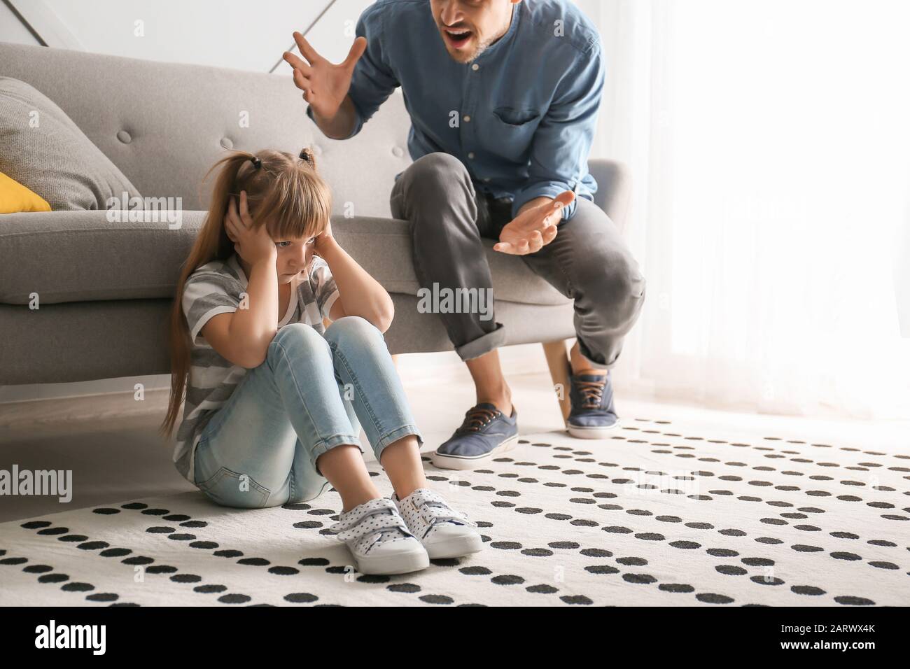 Angry father scolding his little daughter at home Stock Photo - Alamy