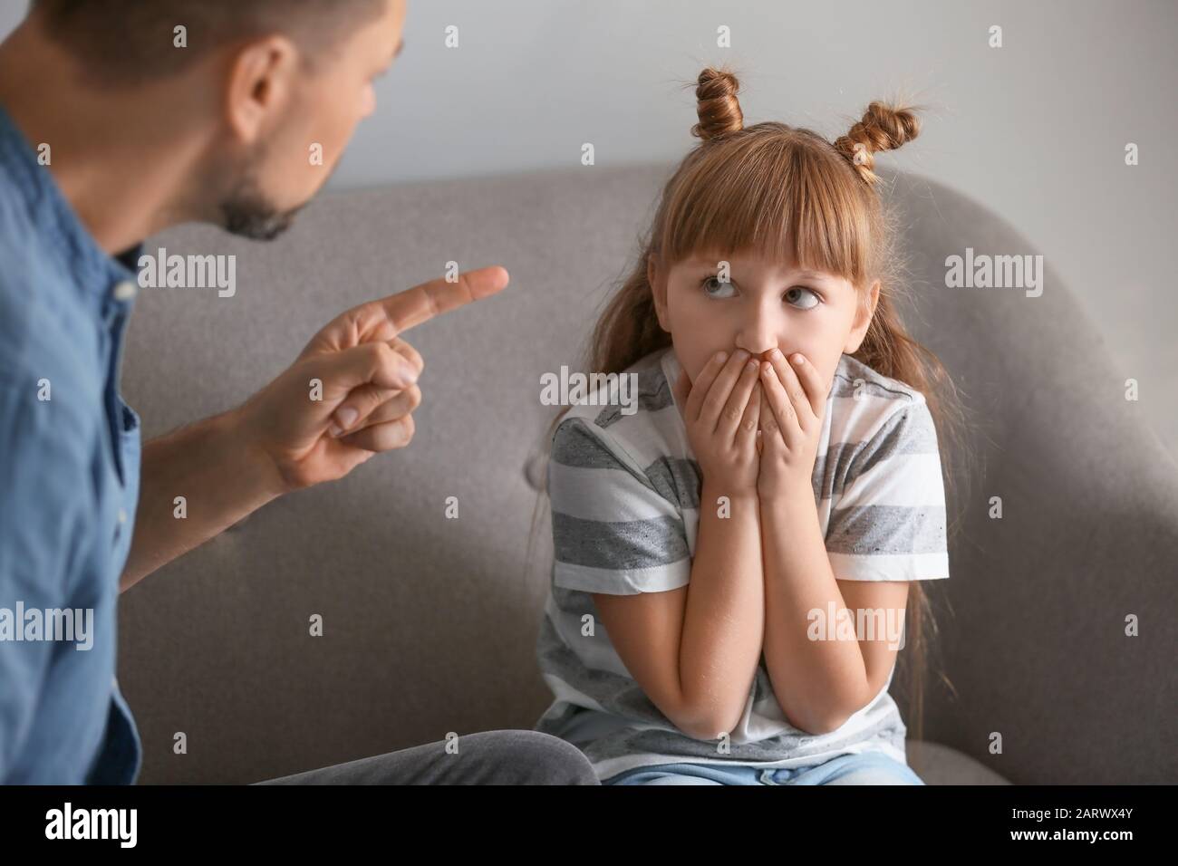 Father scolding his little daughter at home Stock Photo - Alamy