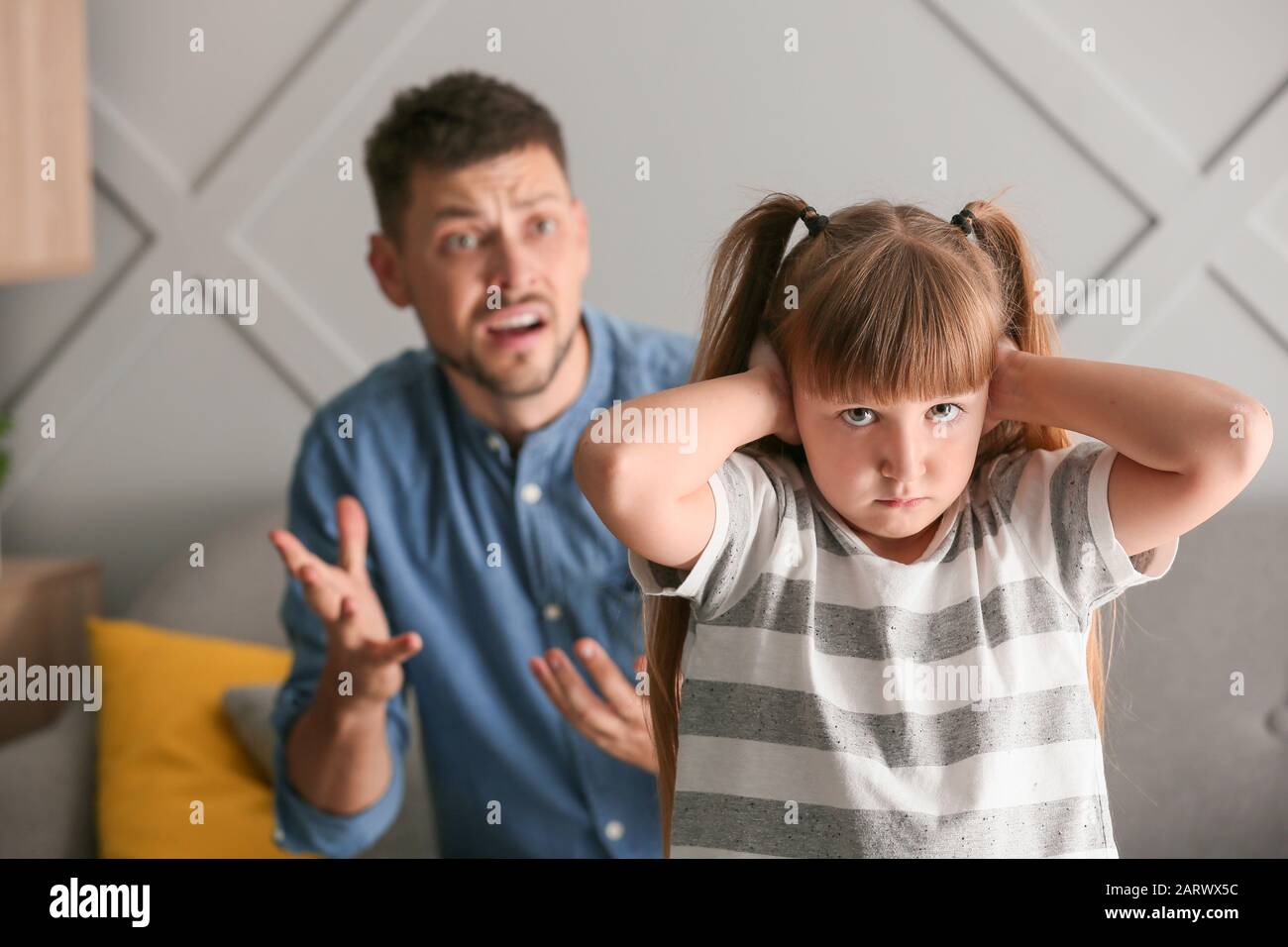 Angry father scolding his little daughter at home Stock Photo - Alamy