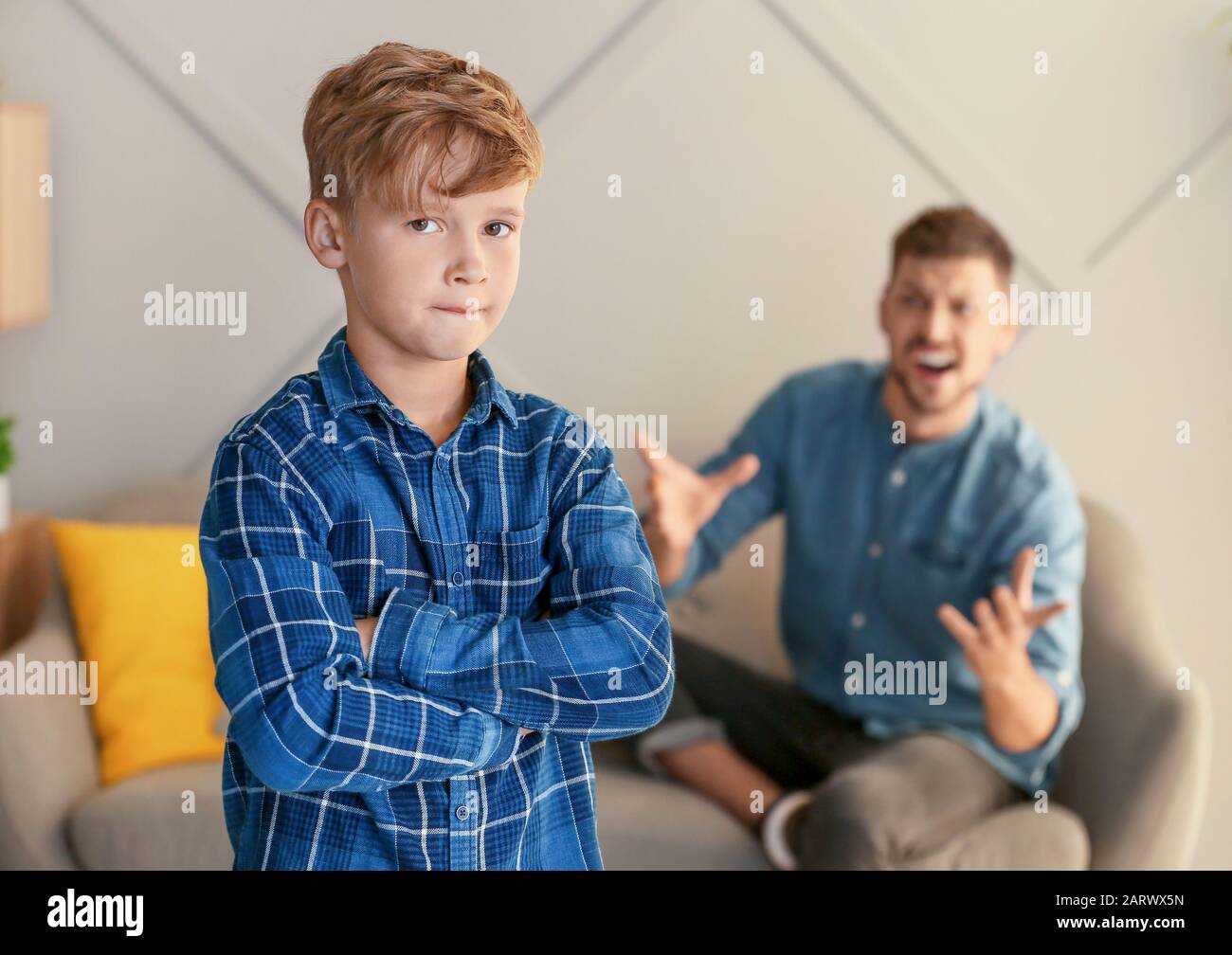 Father scolding his little son at home Stock Photo - Alamy