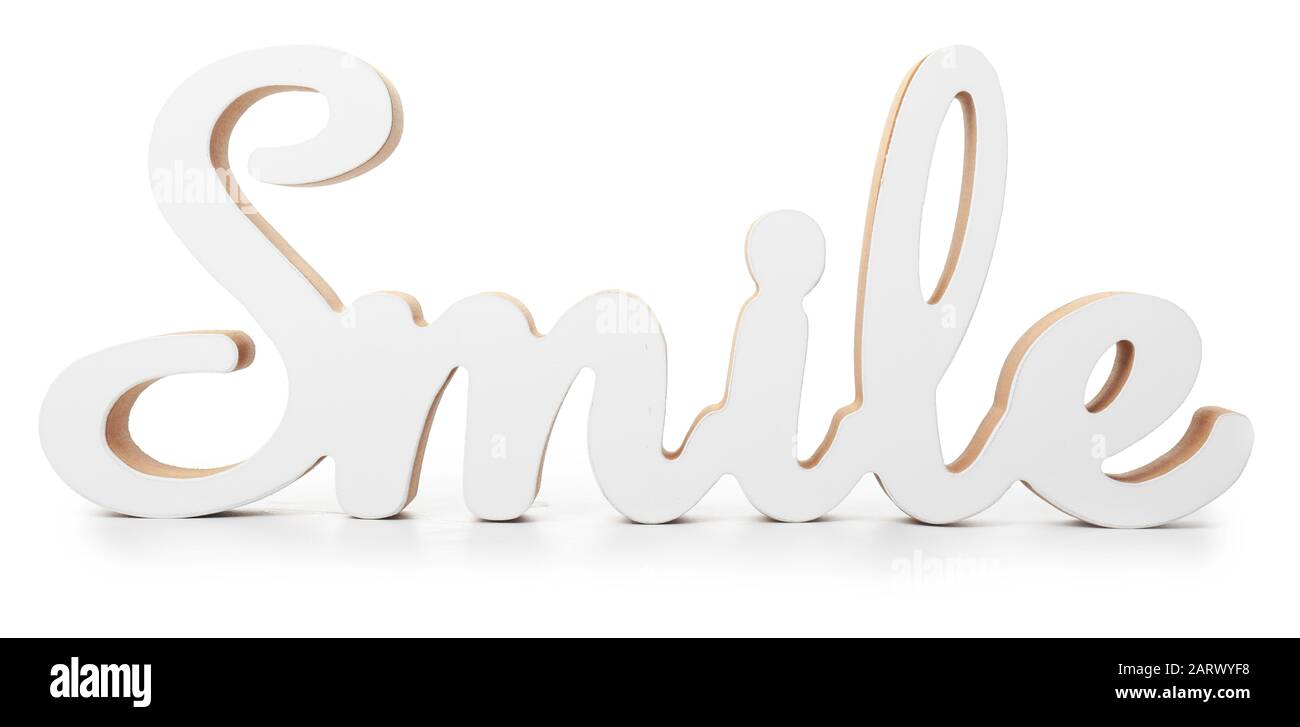 Decor in shape of word SMILE on white background Stock Photo - Alamy