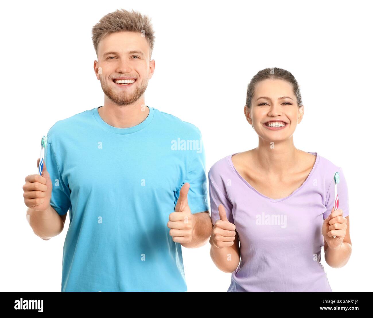 Couple brushing teeth on white hi-res stock photography and images - Alamy