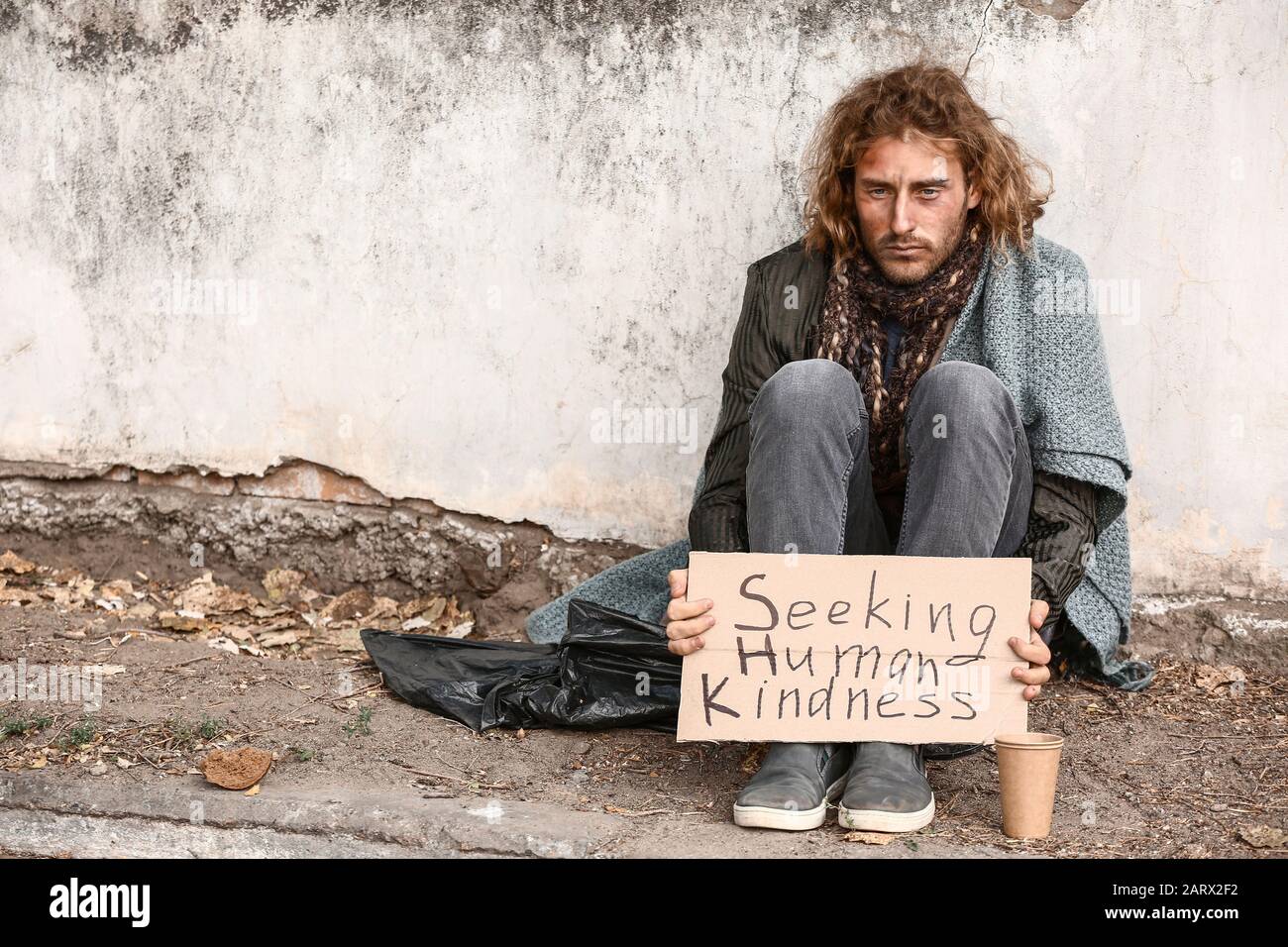 Portrait of poor homeless man outdoors Stock Photo - Alamy