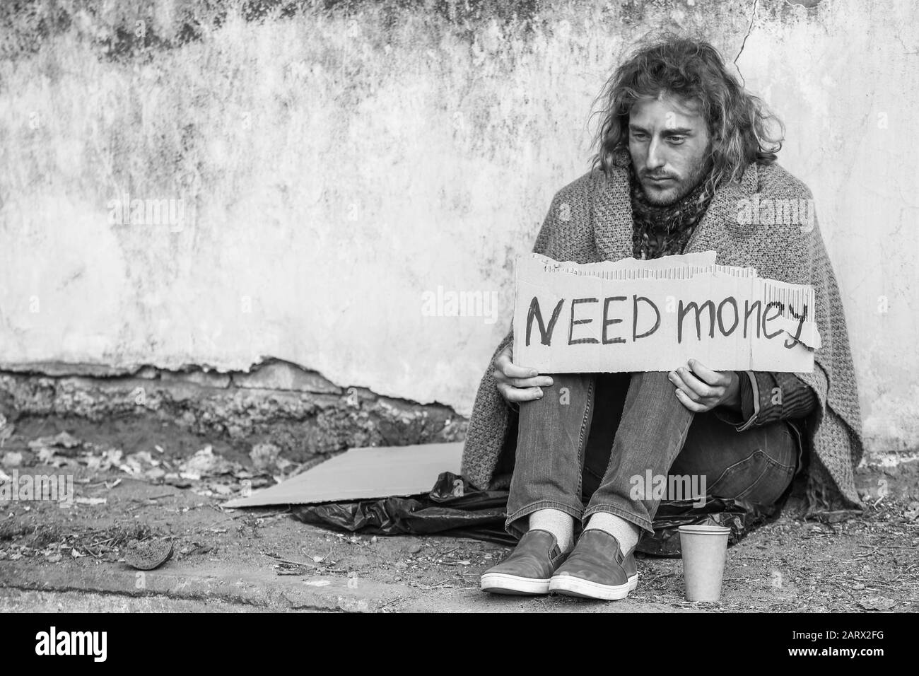 Black and white portrait of poor homeless man outdoors Stock Photo - Alamy