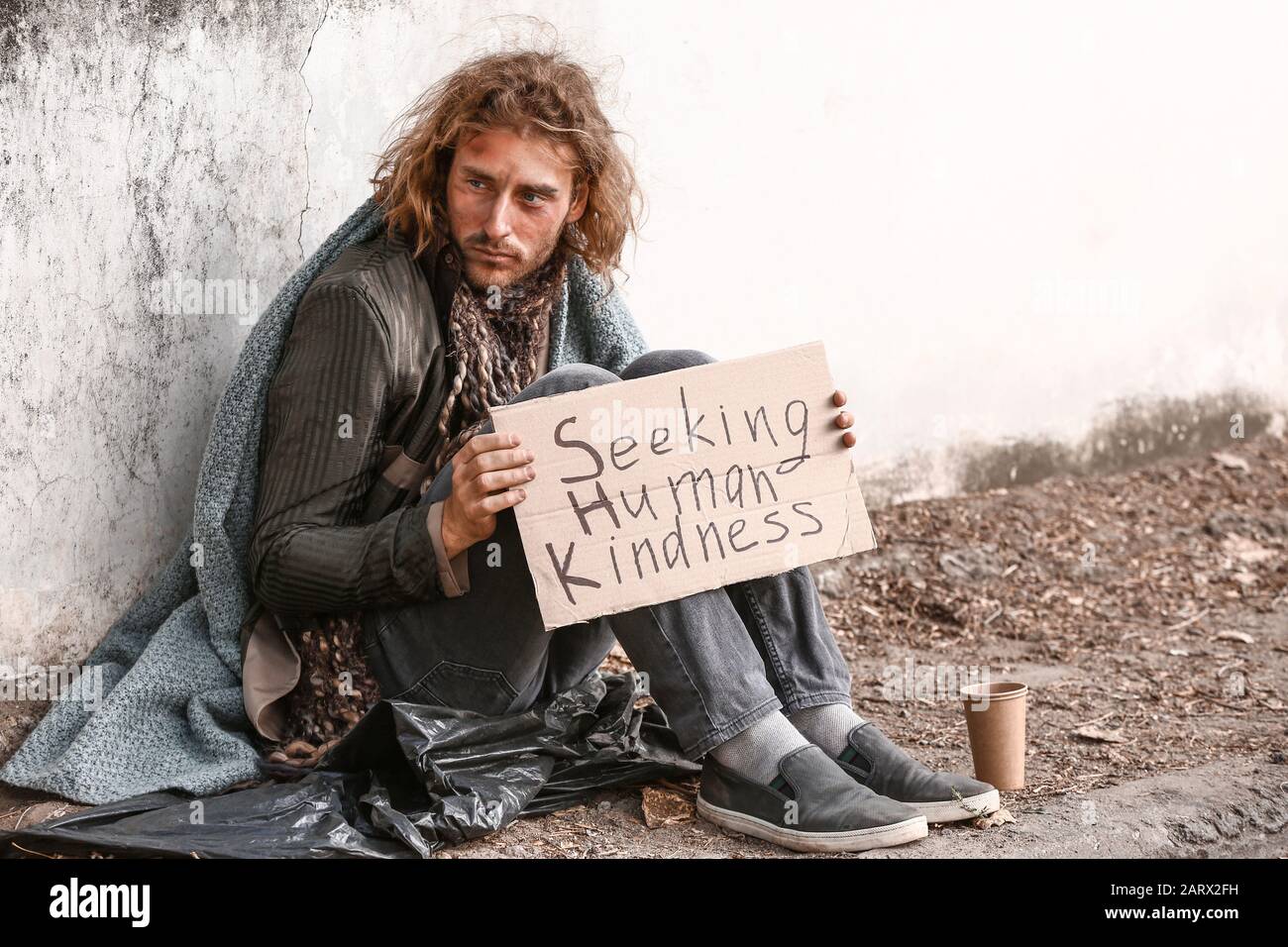 Portrait of poor homeless man outdoors Stock Photo - Alamy