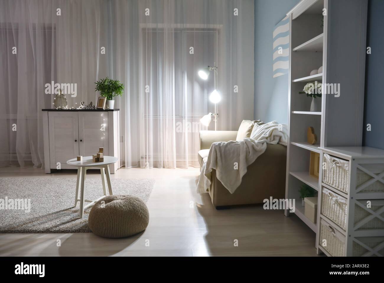 Stylish interior of room at night Stock Photo - Alamy