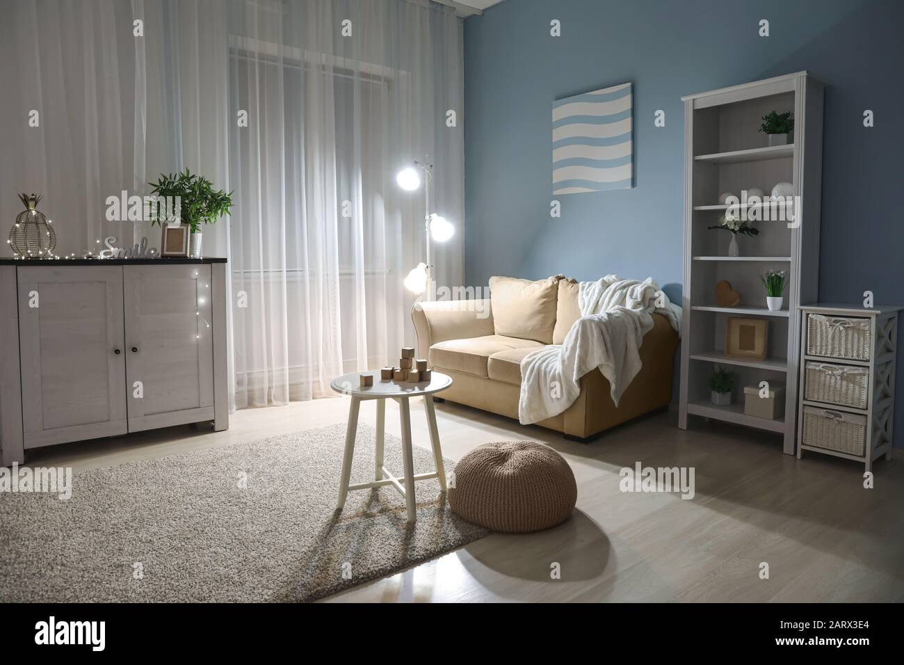 Stylish interior of room at night Stock Photo - Alamy