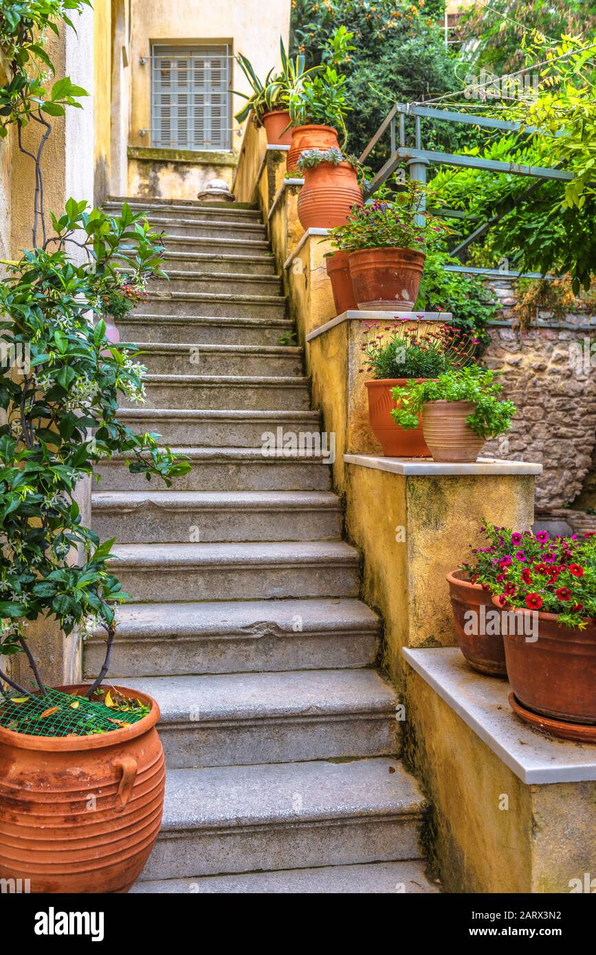 Old narrow street in Plaka district, Athens, Greece. Plaka is a famous ...