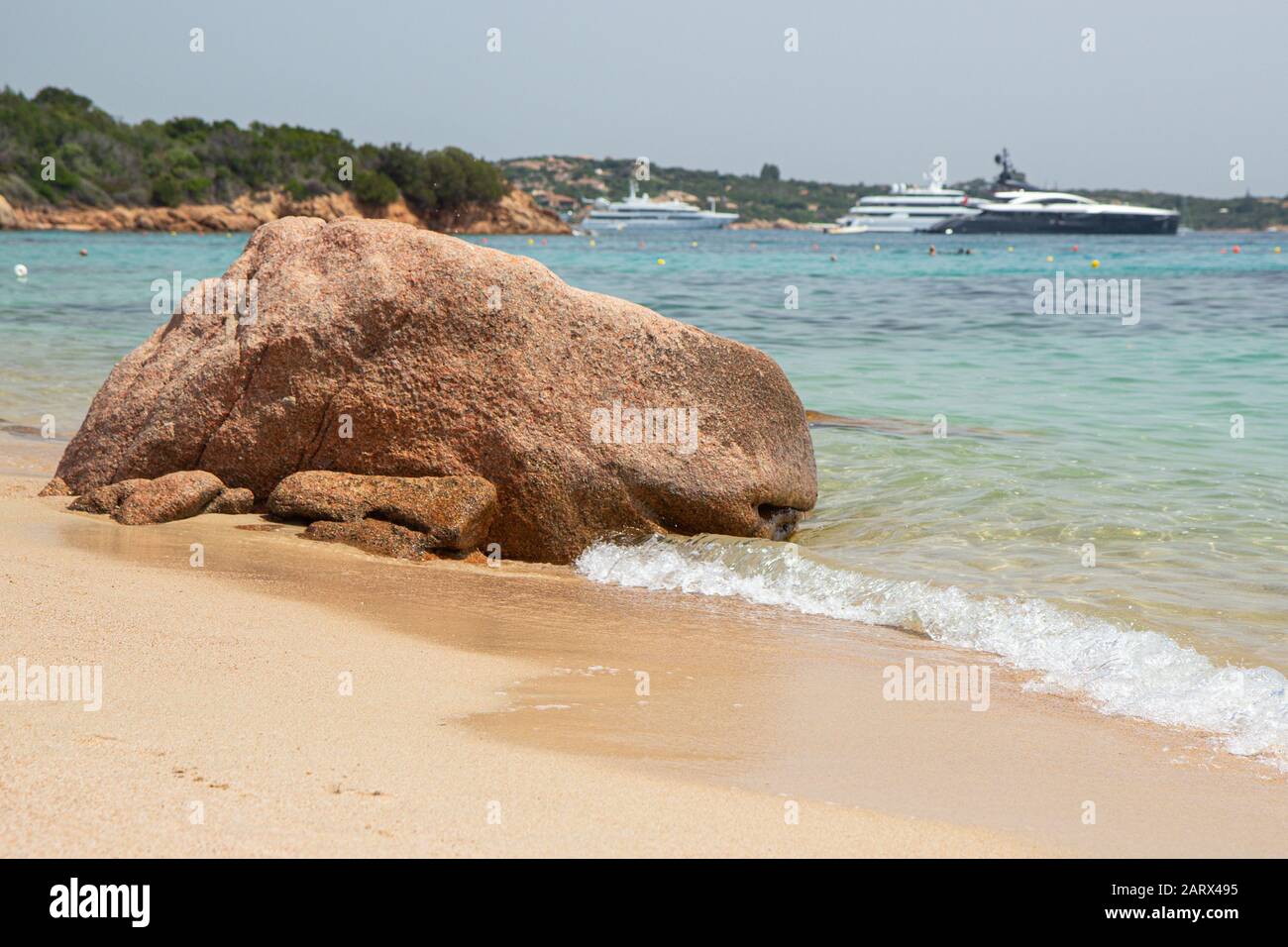 stones on Liscia Ruja beach on Sardinia Stock Photo - Alamy
