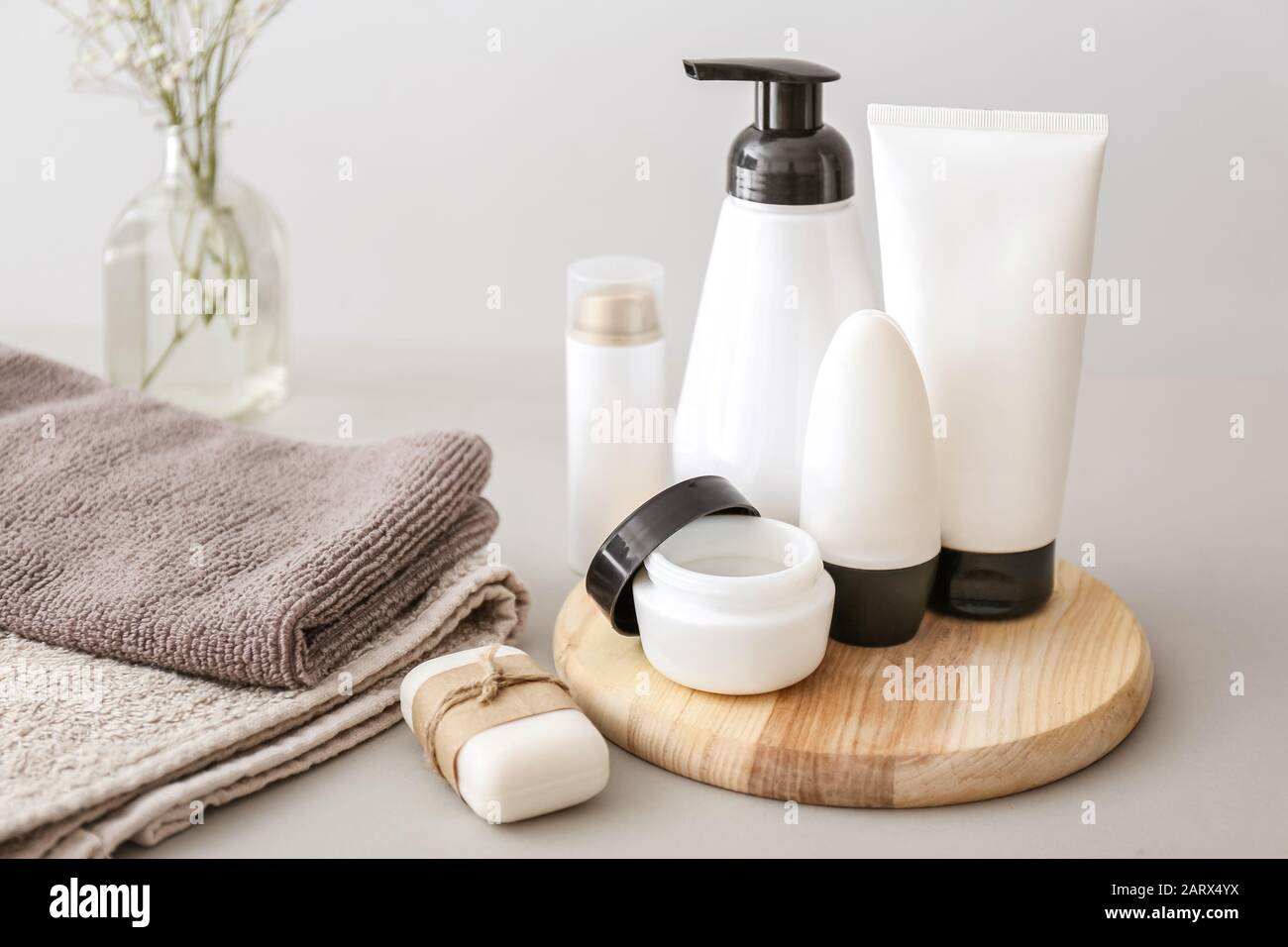 Cosmetics for personal hygiene on light background Stock Photo - Alamy