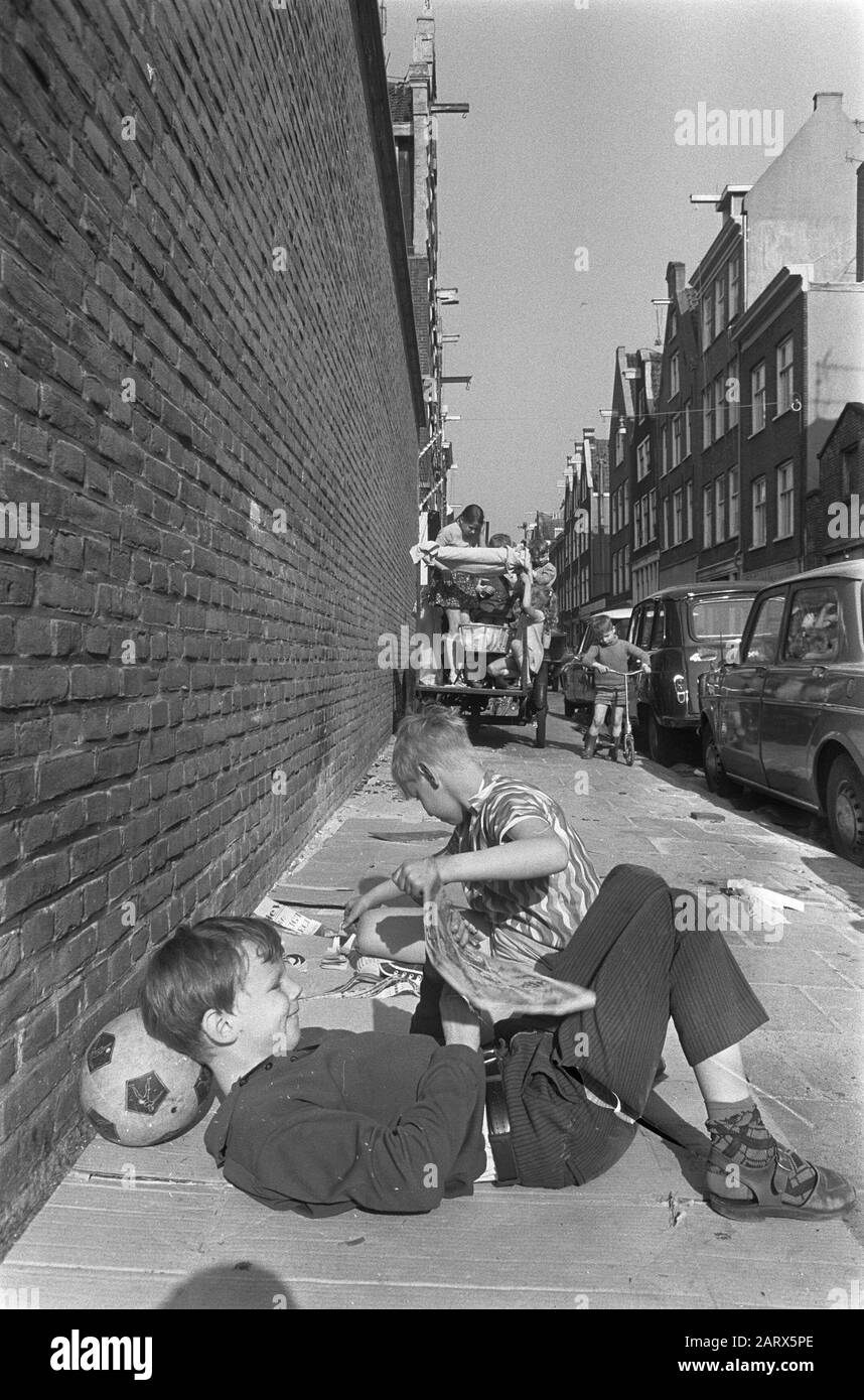 Spring in the city children Date: April 8, 1969 Stock Photo - Alamy