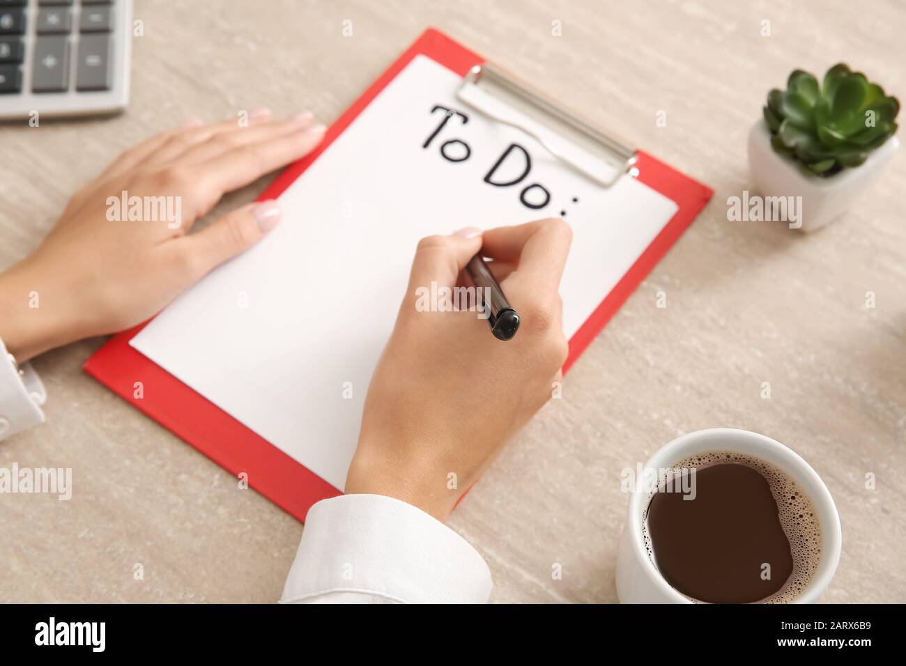 Woman making list table hi-res stock photography and images - Alamy