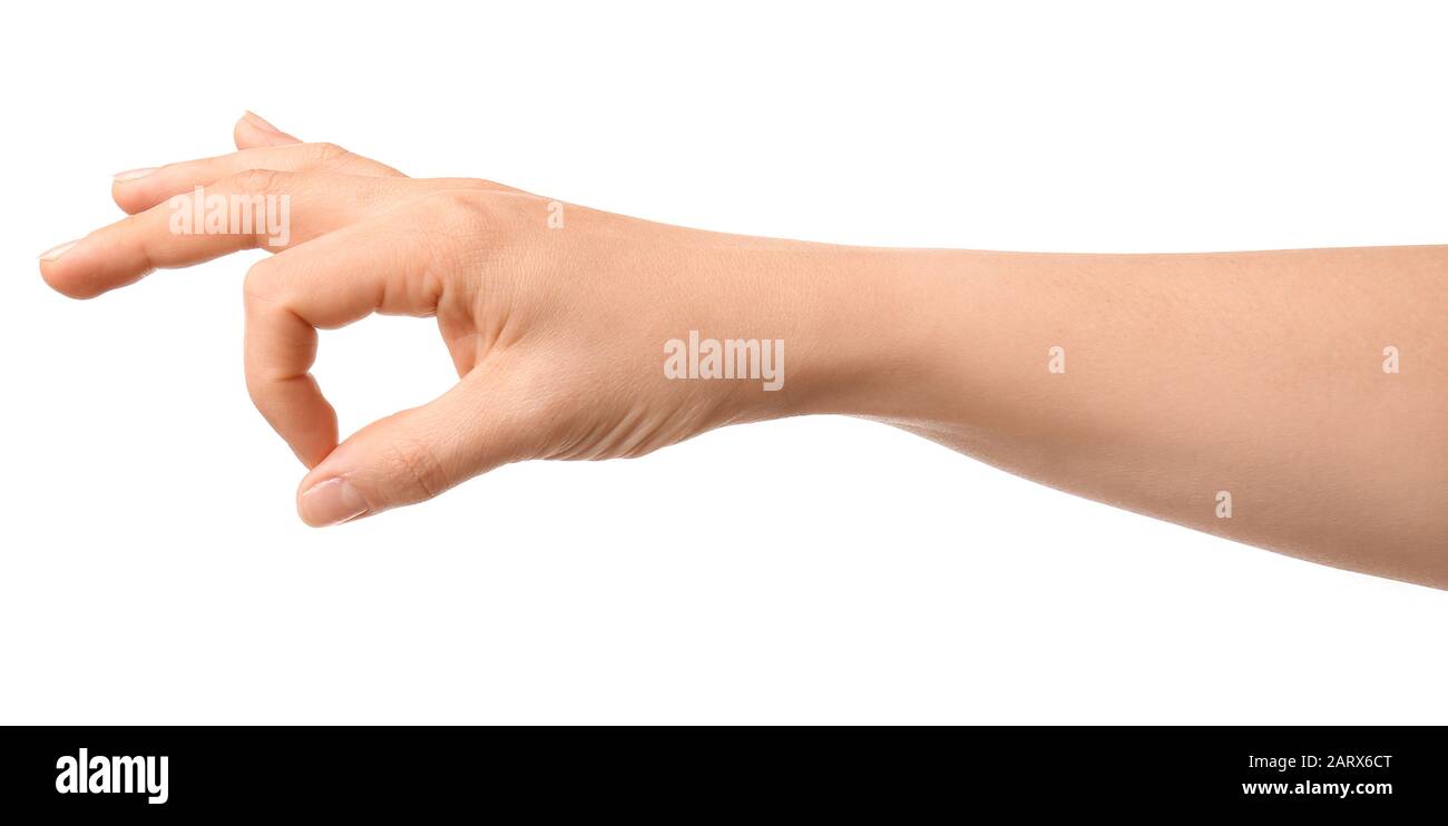 Hand of woman showing OK gesture on white background Stock Photo - Alamy