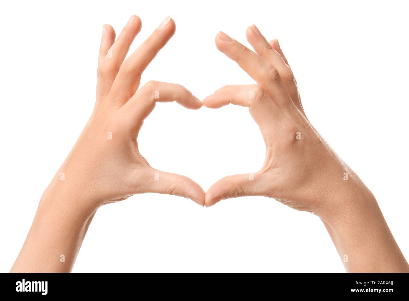 Hands of woman making heart shape on white background Stock Photo - Alamy