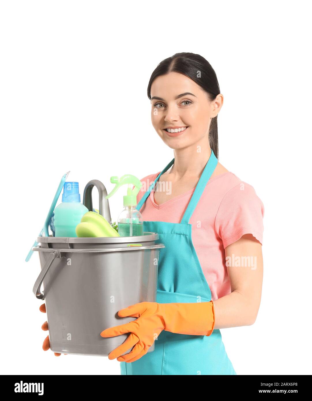 Female janitor with cleaning supplies on white background Stock Photo ...