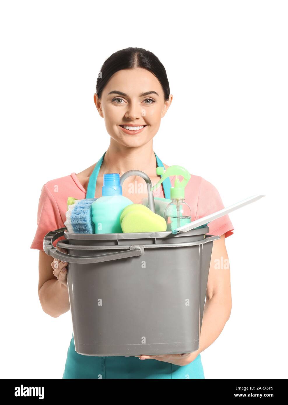 Female janitor with cleaning supplies on white background Stock Photo ...