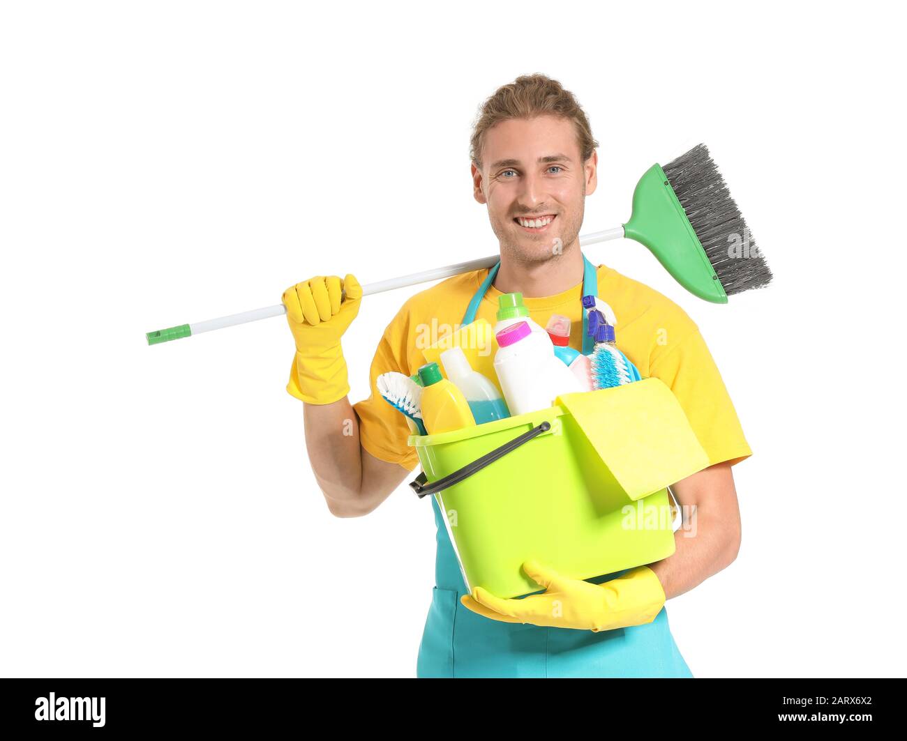 Male janitor with cleaning supplies on white background Stock Photo - Alamy