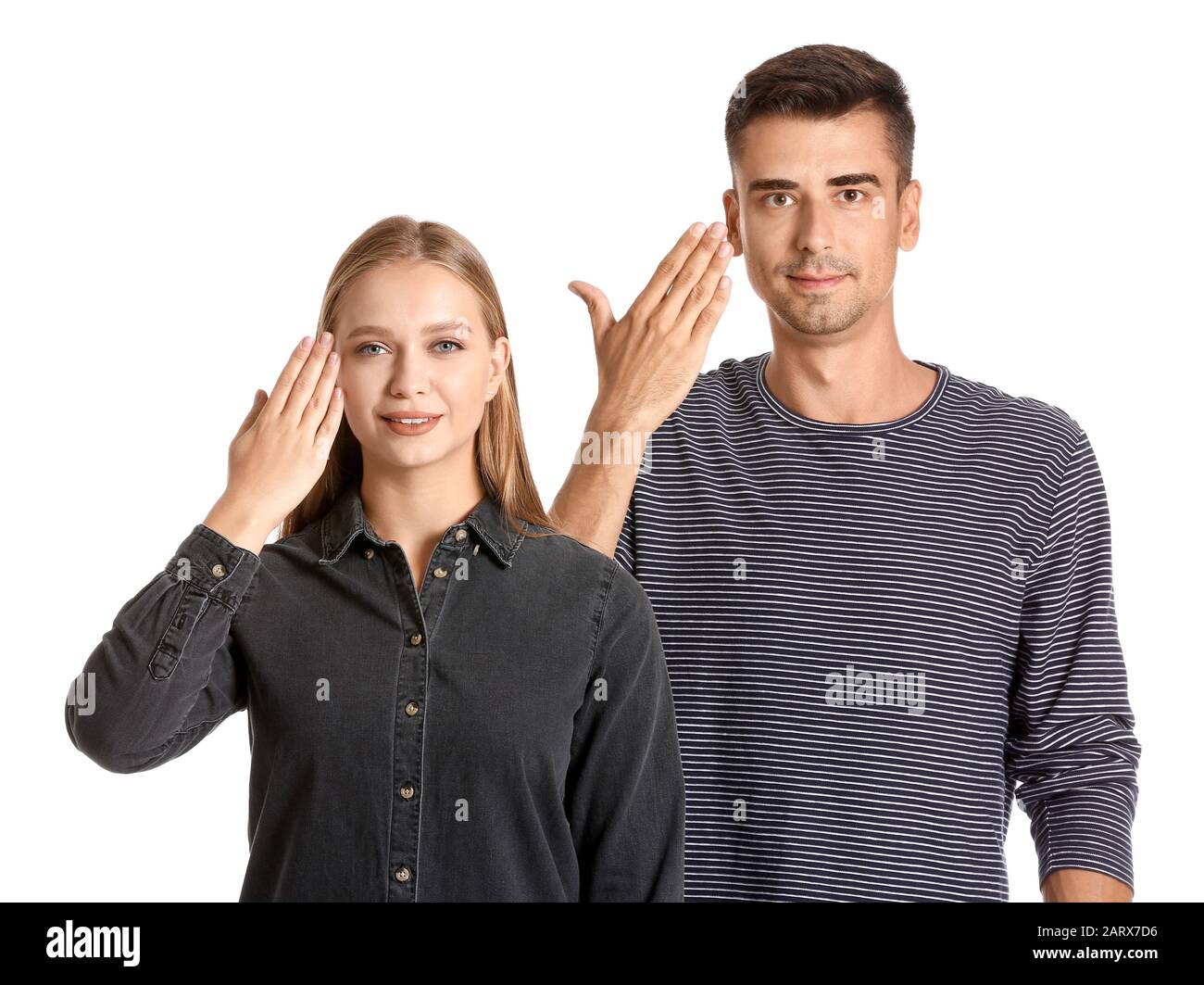 Young deaf mute couple using sign language on white background Stock ...