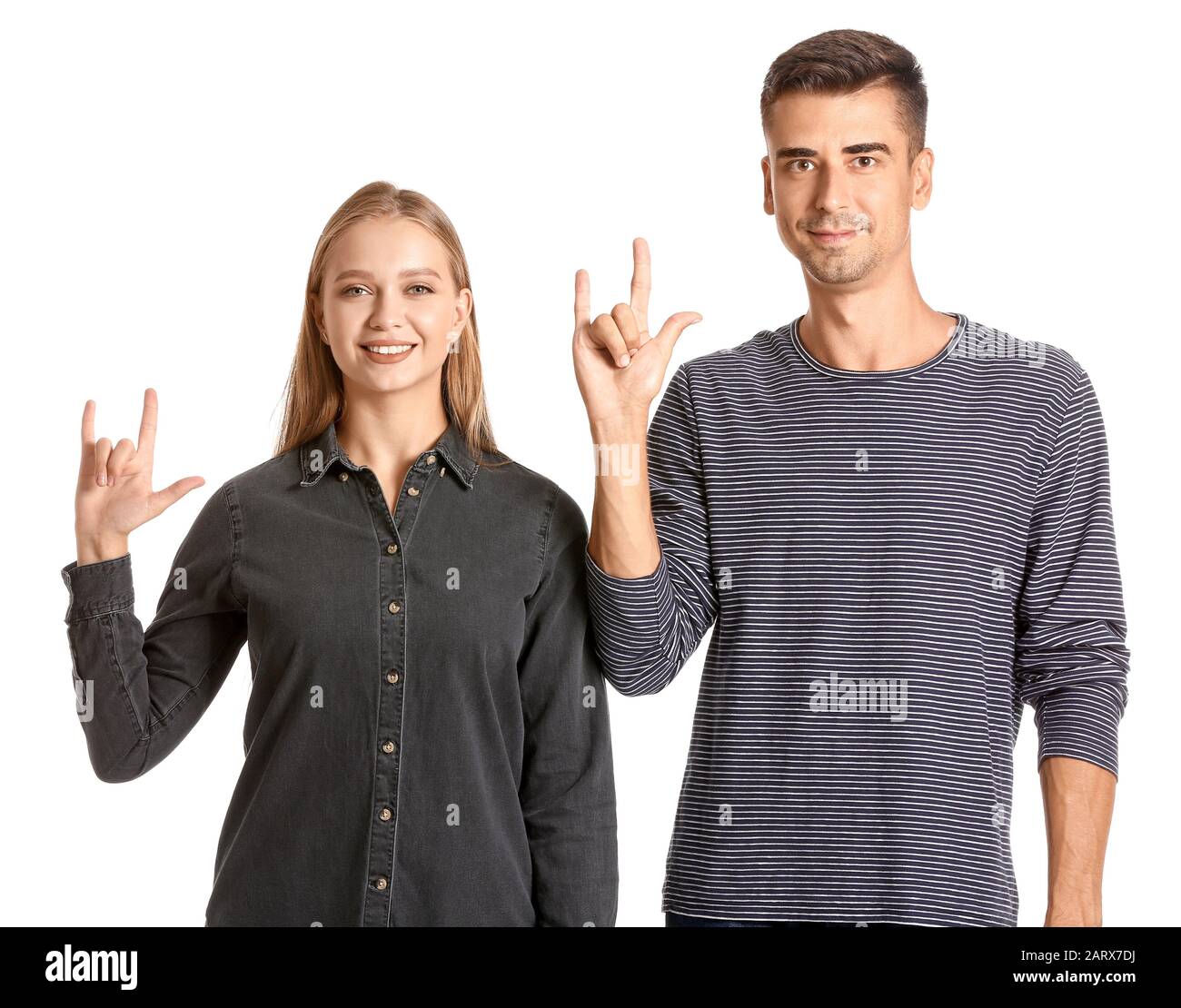 Young deaf mute couple using sign language on white background Stock ...