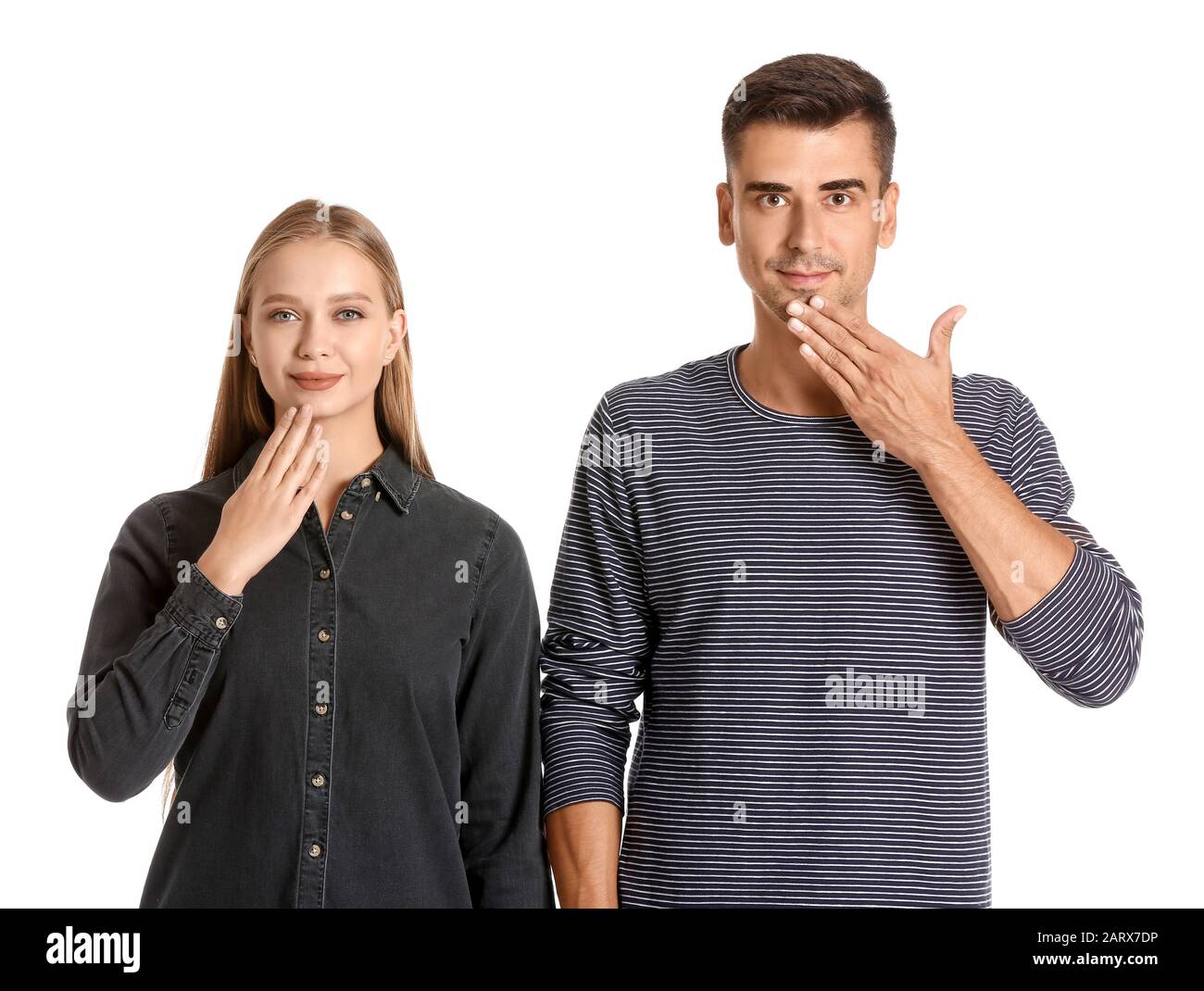 Young deaf mute couple using sign language on white background Stock ...