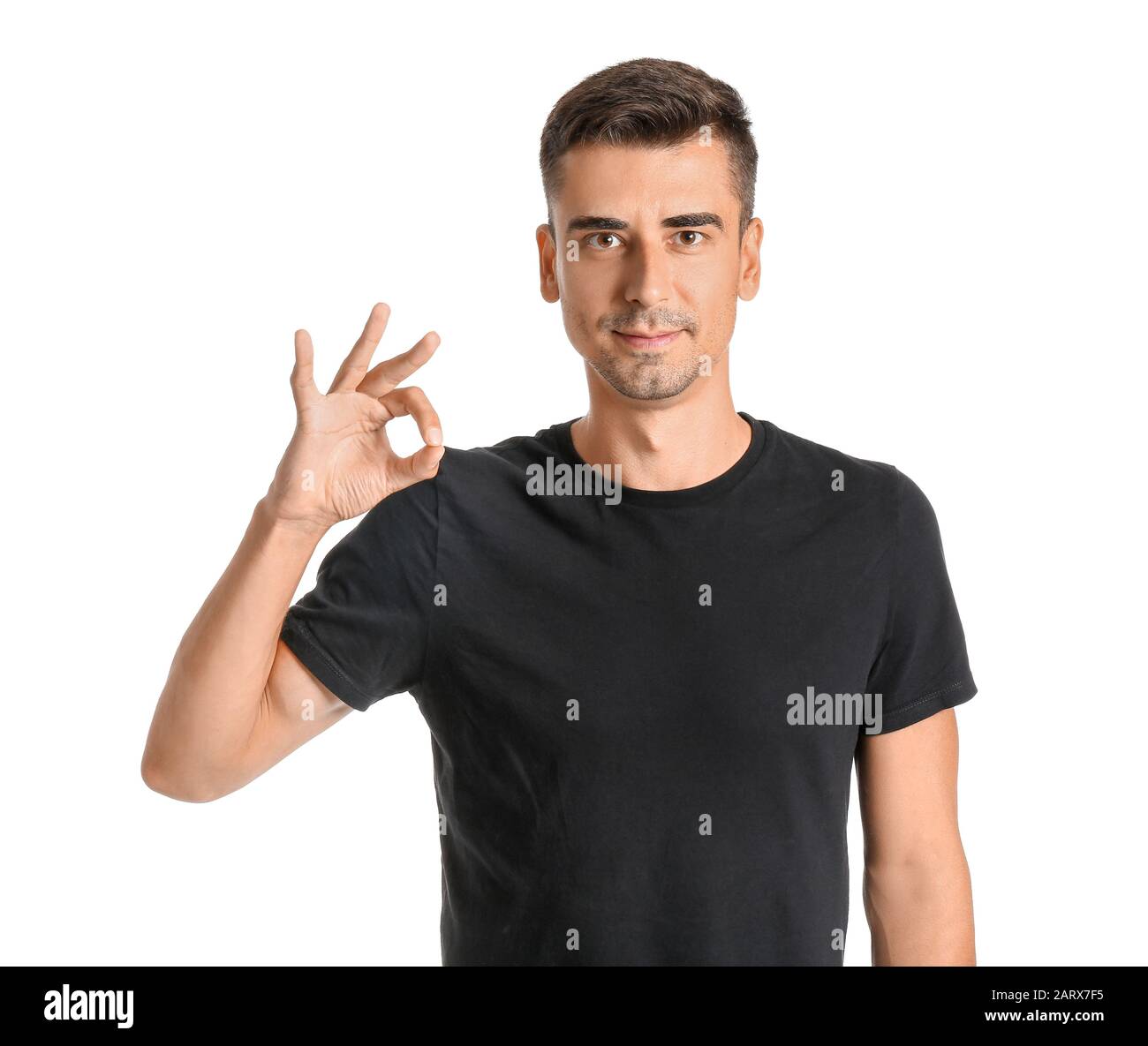 Young deaf mute man using sign language on white background Stock Photo ...