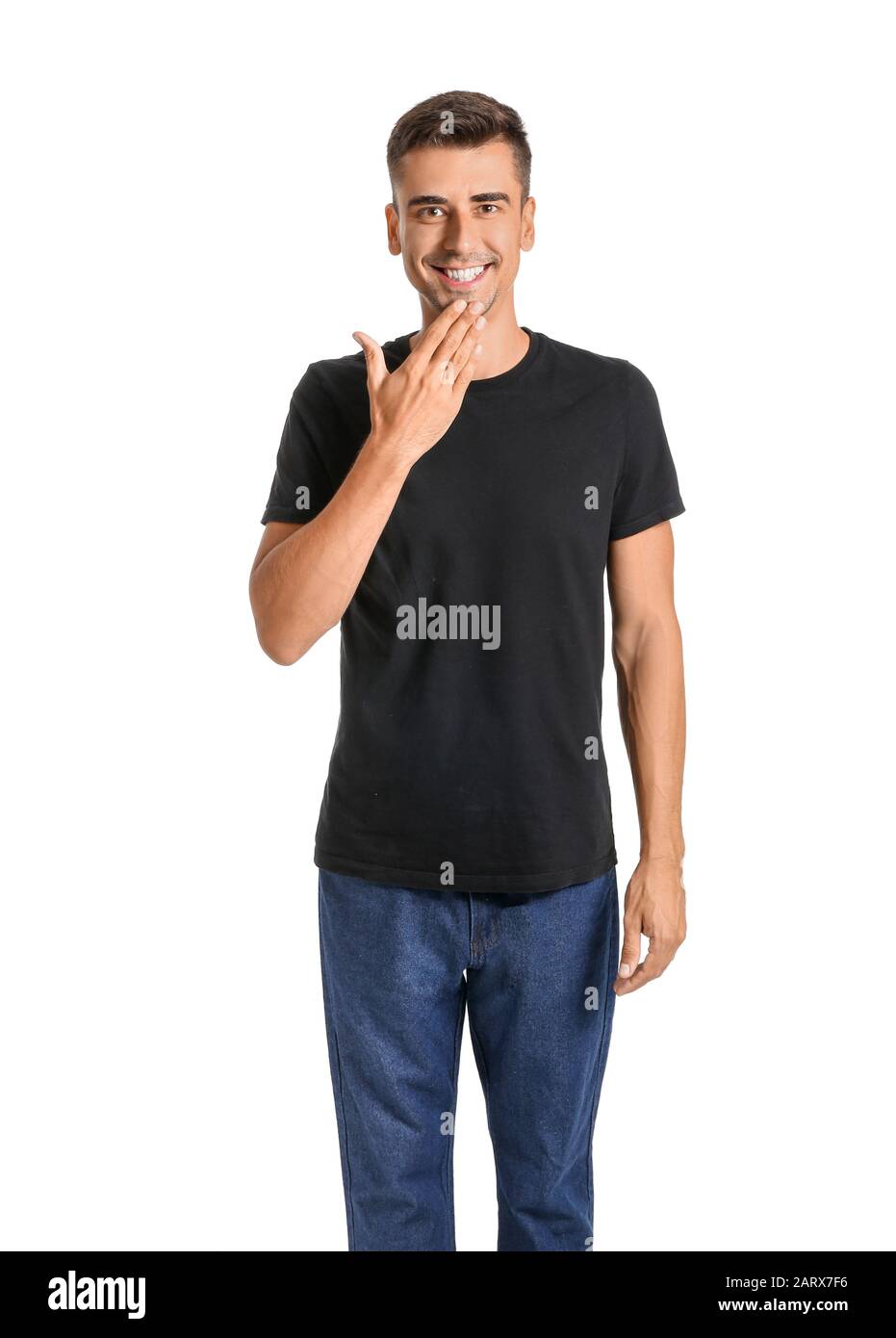 Young deaf mute man using sign language on white background Stock Photo ...