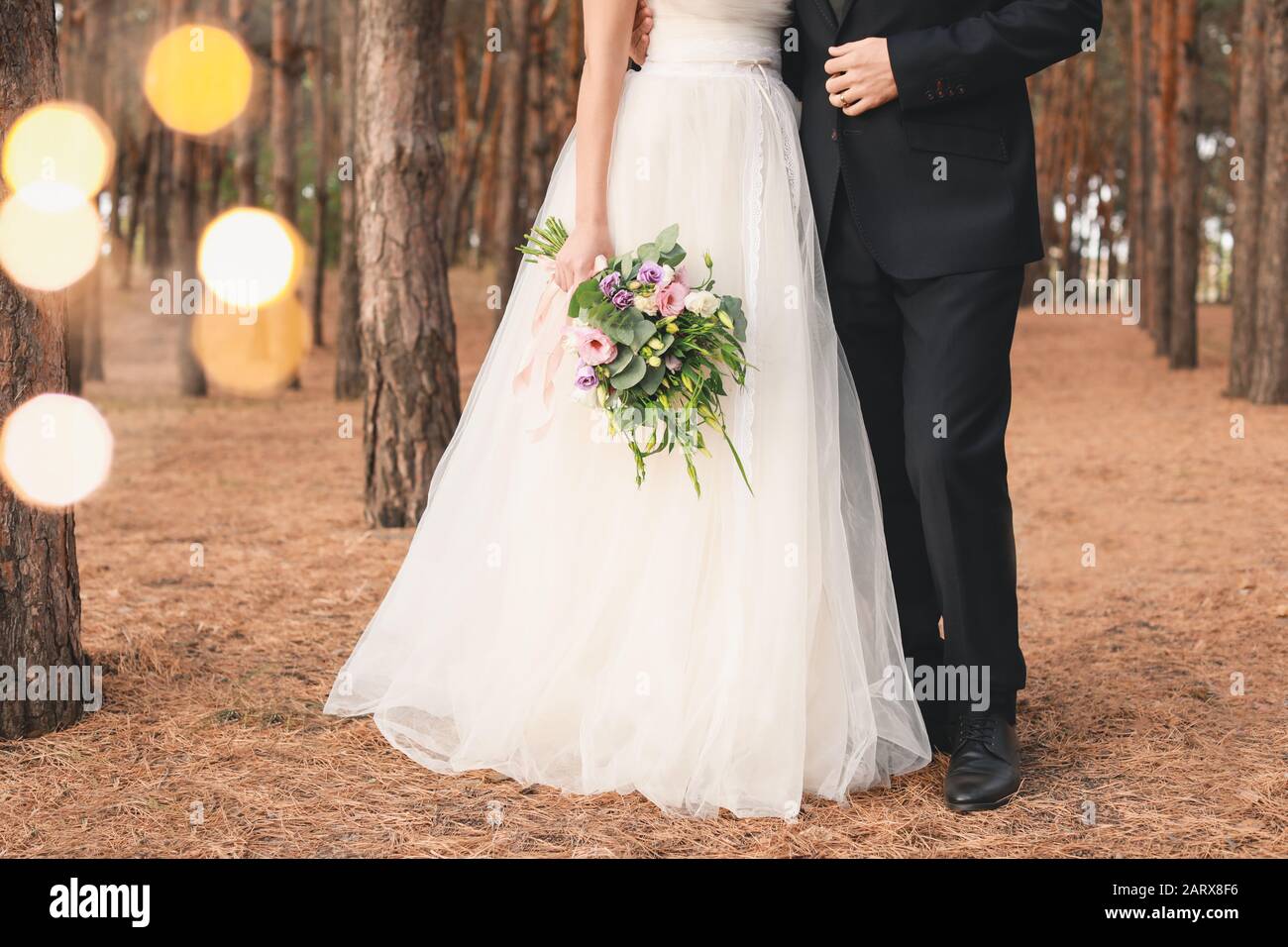 Happy couple celebrating their wedding outdoors Stock Photo - Alamy