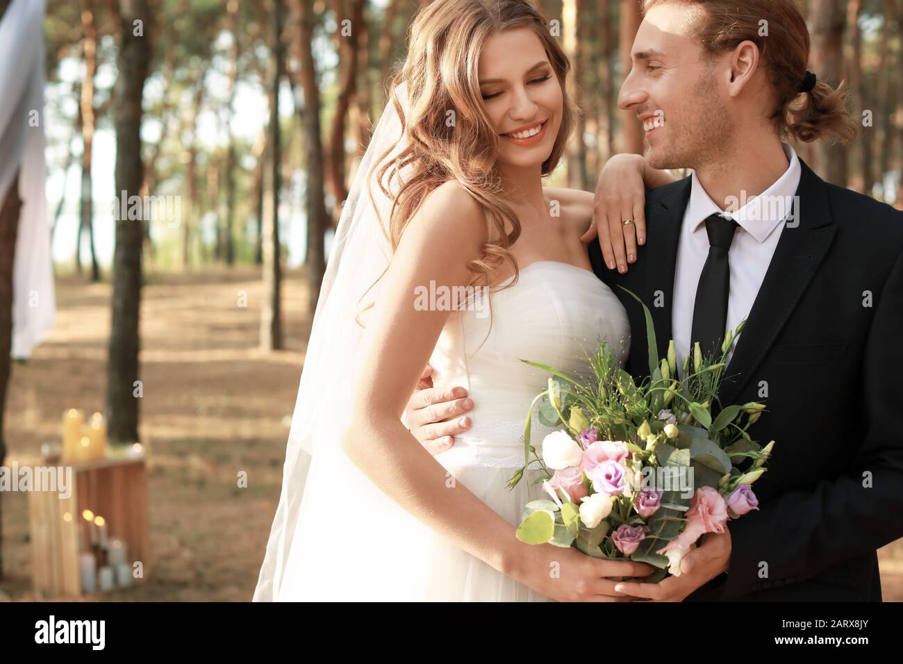 Happy couple celebrating their wedding outdoors Stock Photo - Alamy