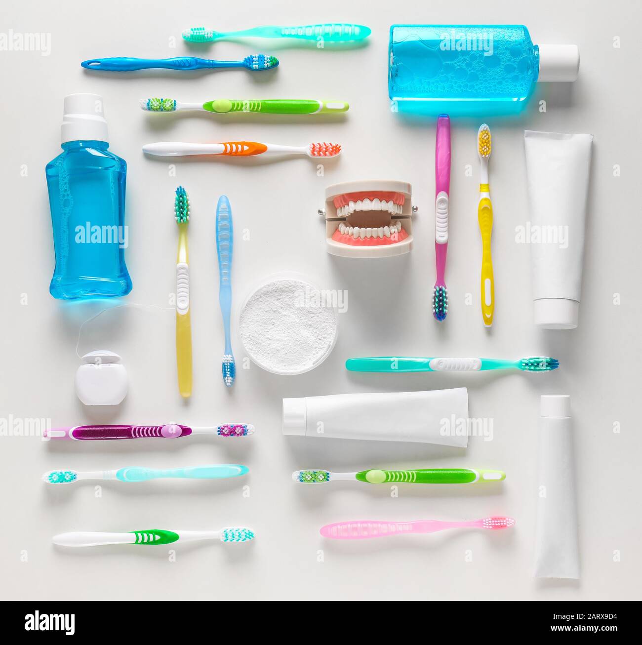Set for dental hygiene on light background Stock Photo - Alamy