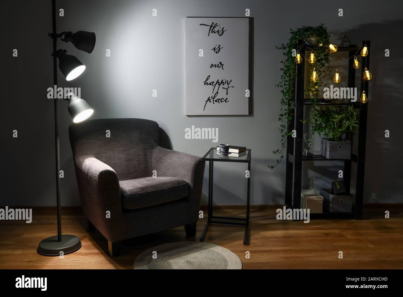 Stylish interior of living room at night Stock Photo - Alamy