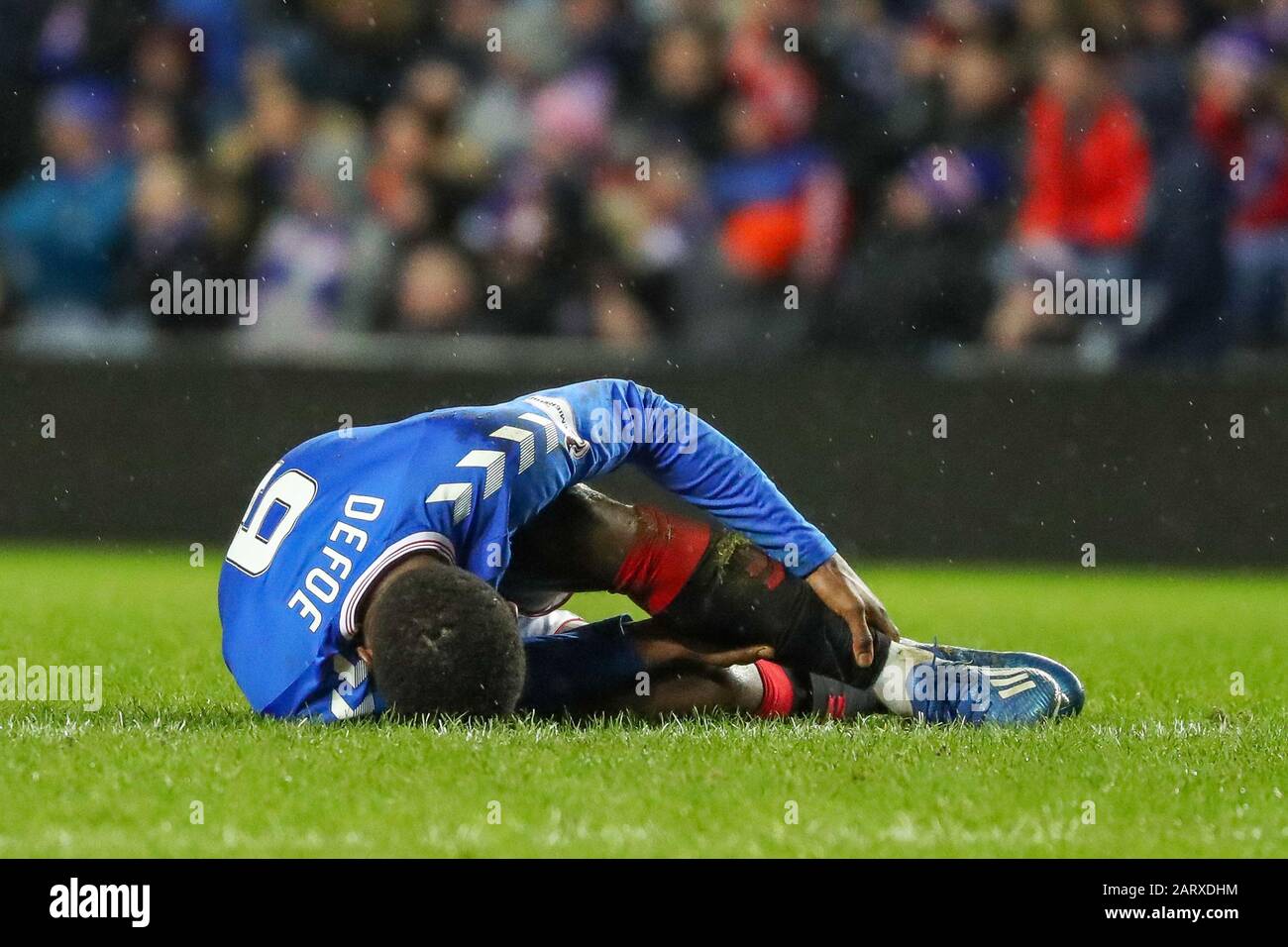 Injured player is carried off pitch hi-res stock photography and images ...