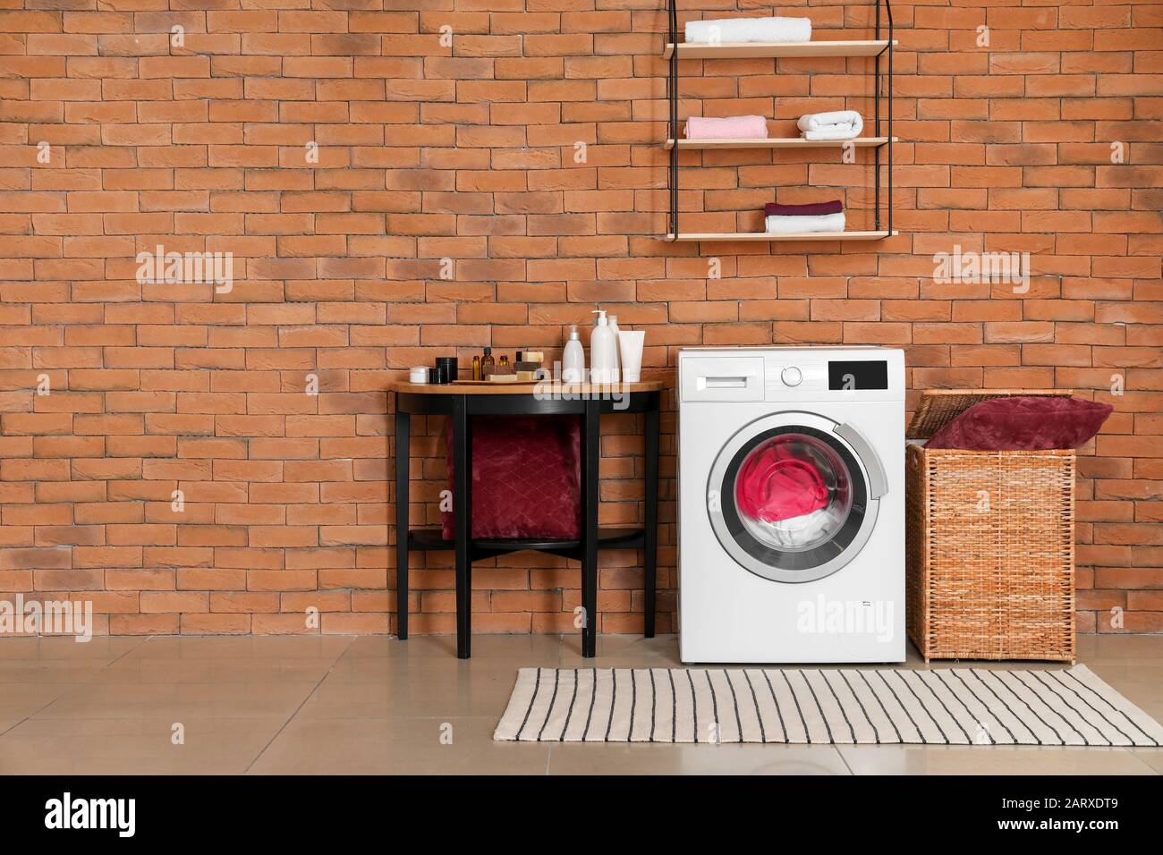Interior of room with modern washing machine Stock Photo - Alamy