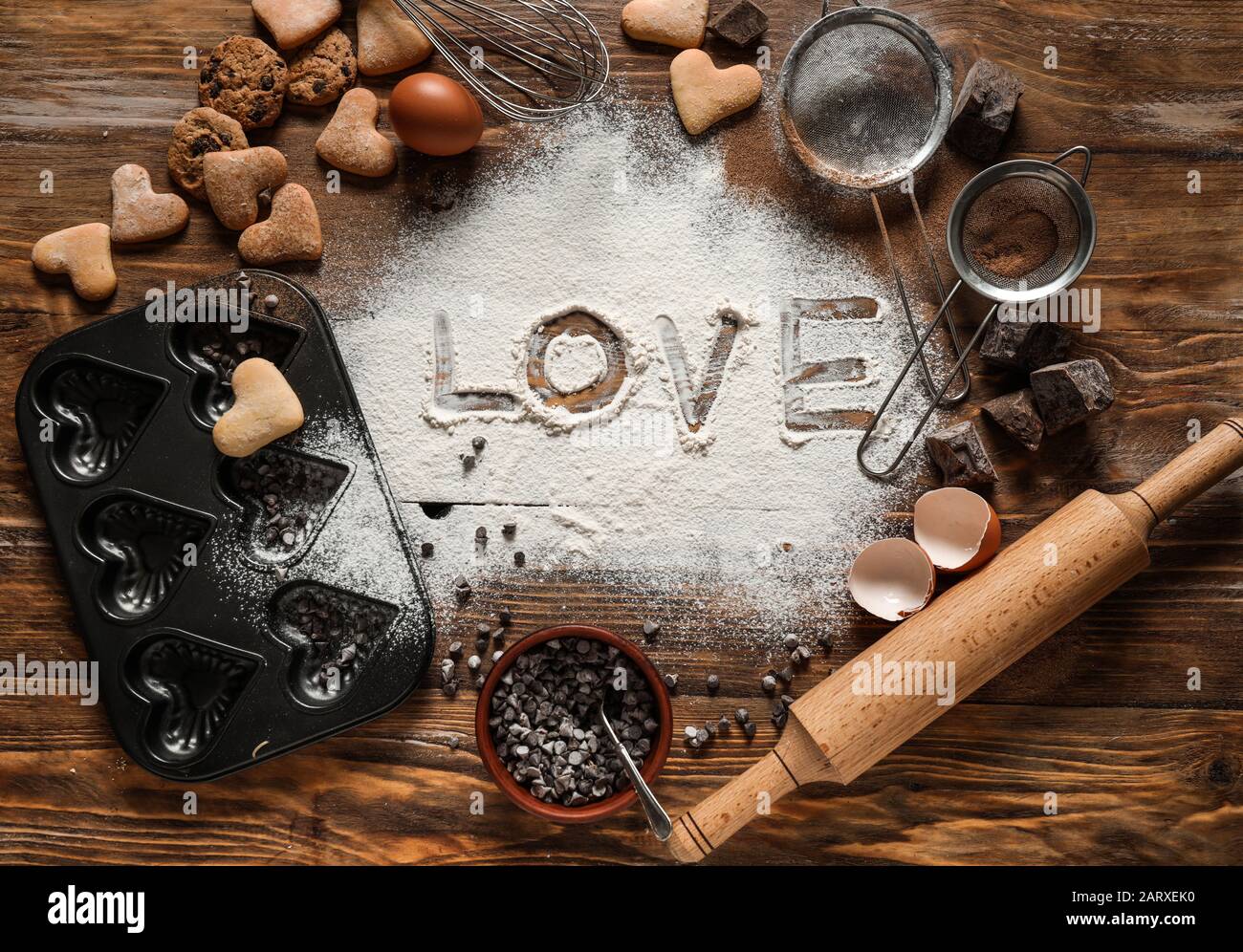Word LOVE written on flour, top view Stock Photo - Alamy