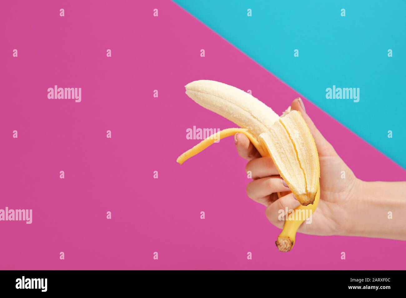 Woman peeled banana hi-res stock photography and images - Alamy
