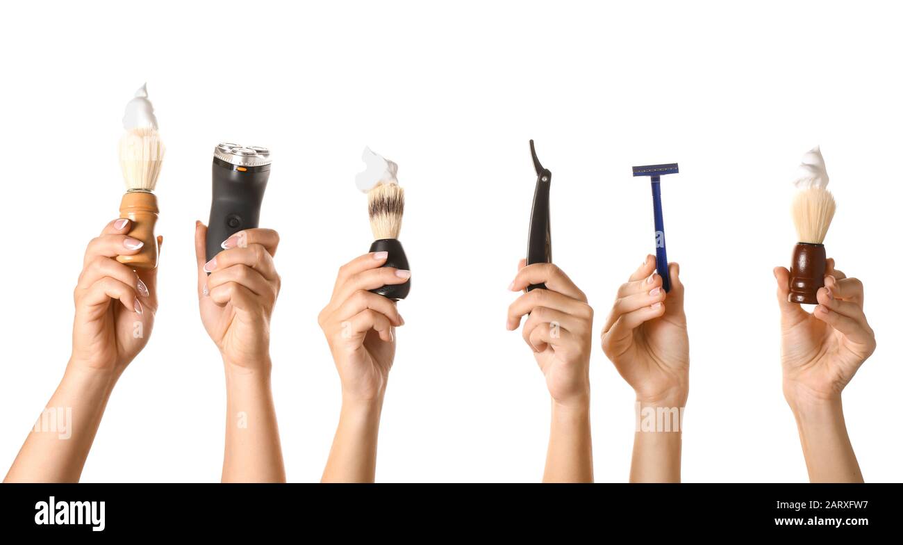 Hands with different tools for shaving on white background Stock Photo ...