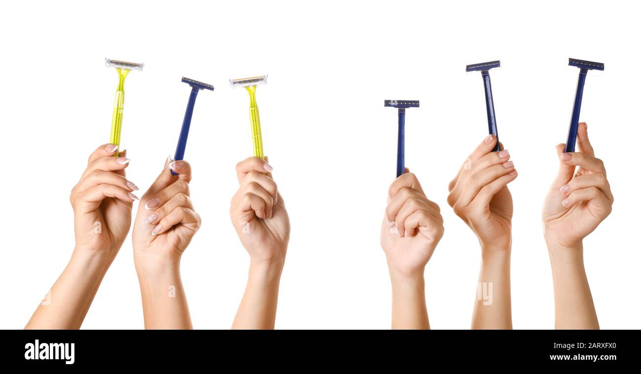 Hands with different razors for shaving on white background Stock Photo ...