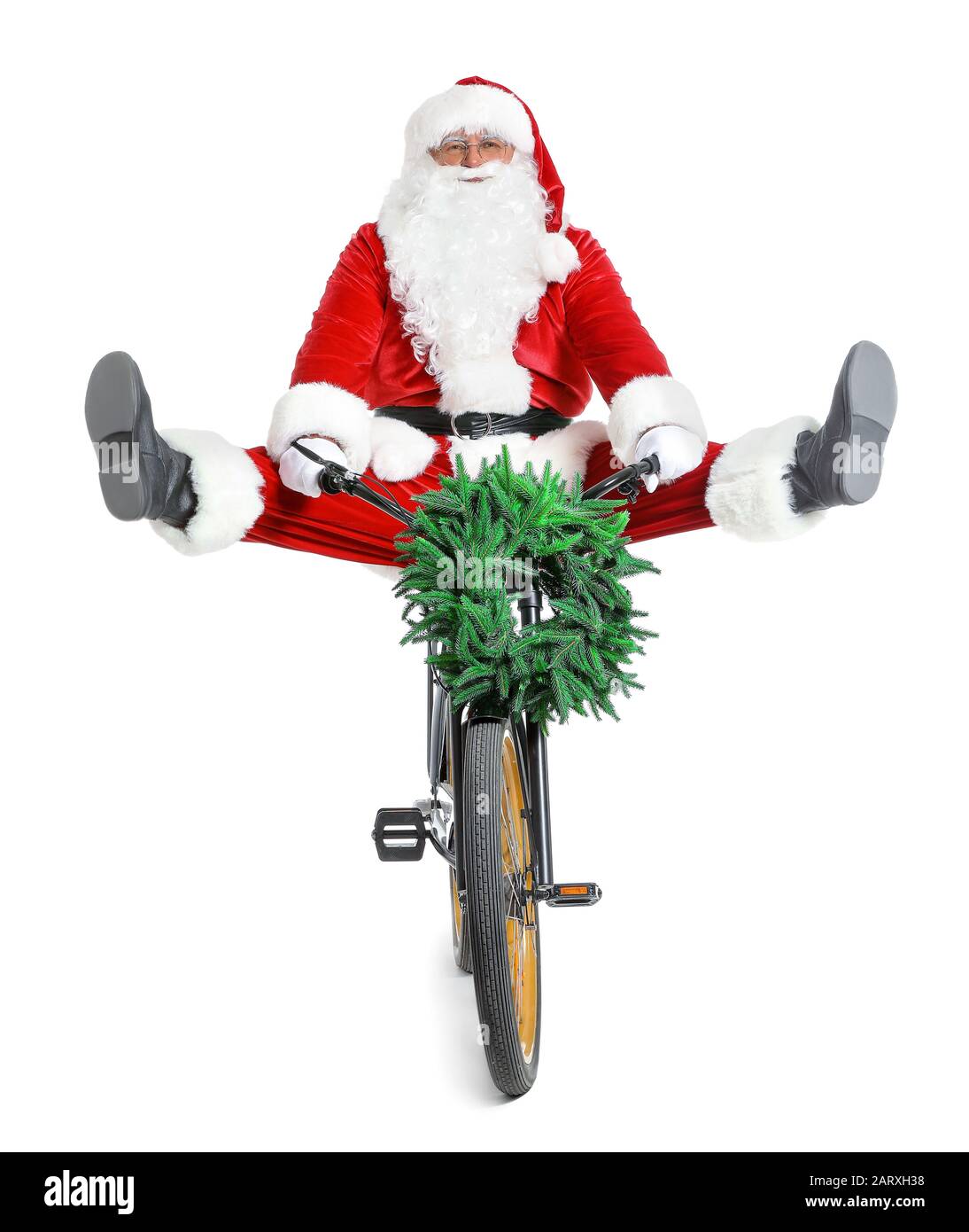 Santa Claus riding bicycle on white background Stock Photo - Alamy