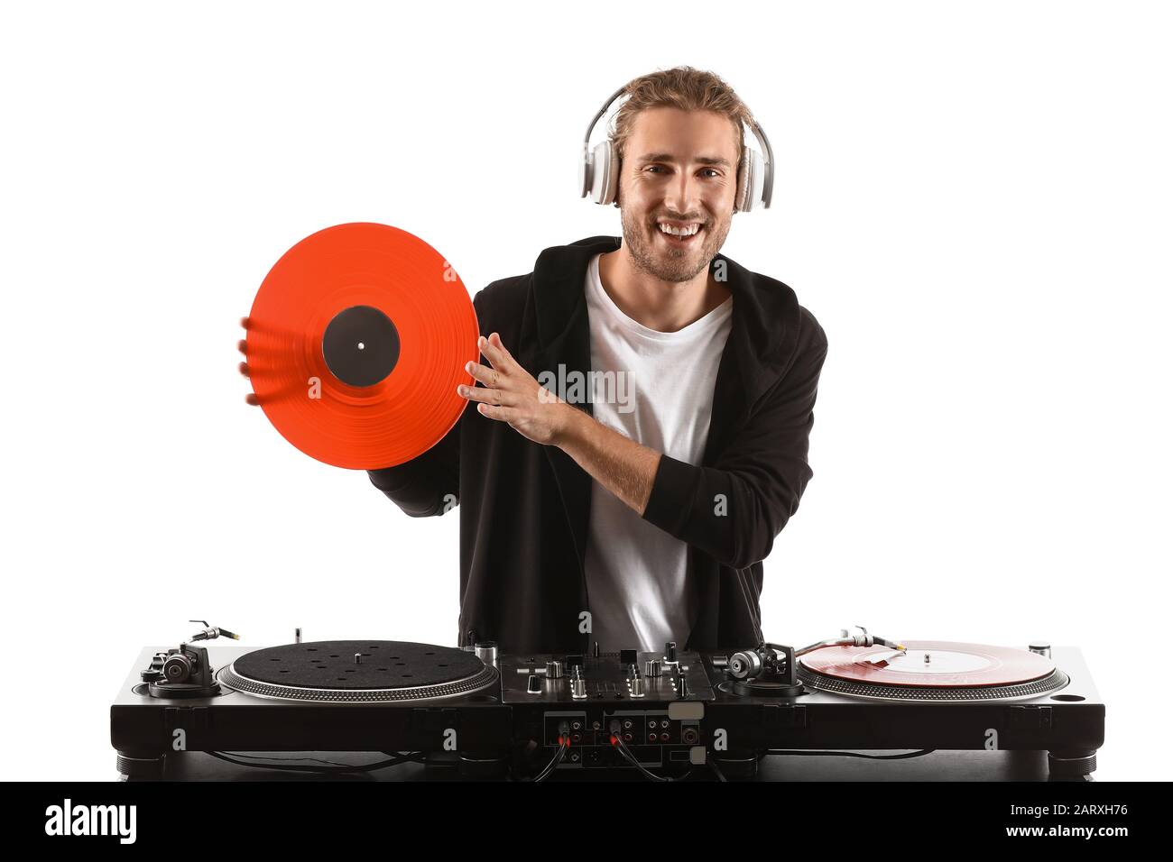 Male dj playing music on white background Stock Photo - Alamy
