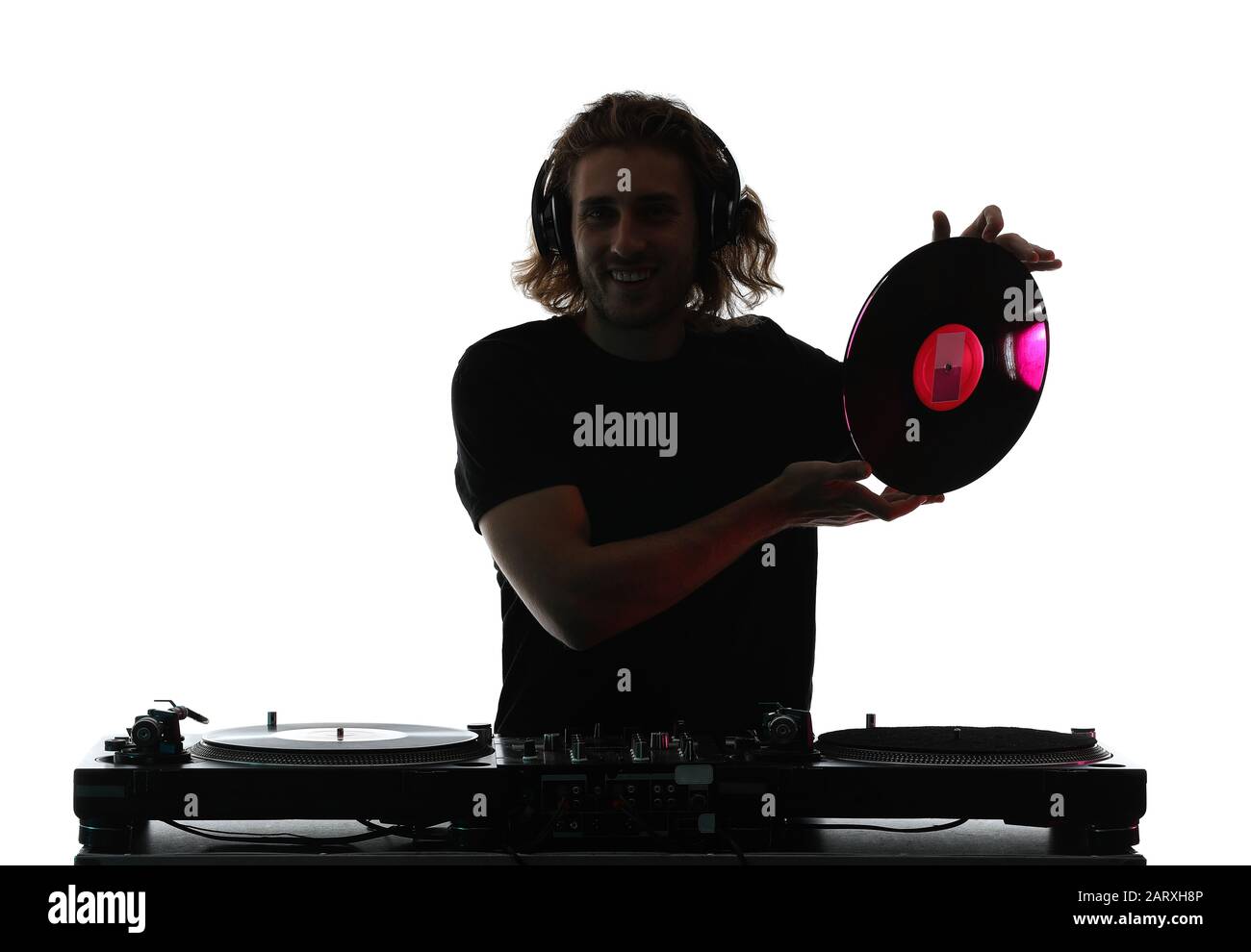 Silhouette of male dj playing music on white background Stock Photo - Alamy
