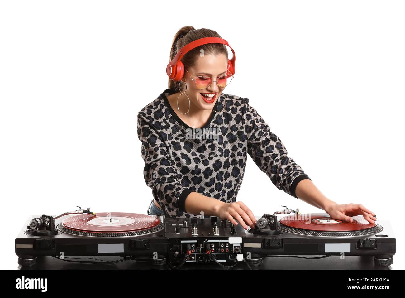 Female dj playing music on white background Stock Photo - Alamy