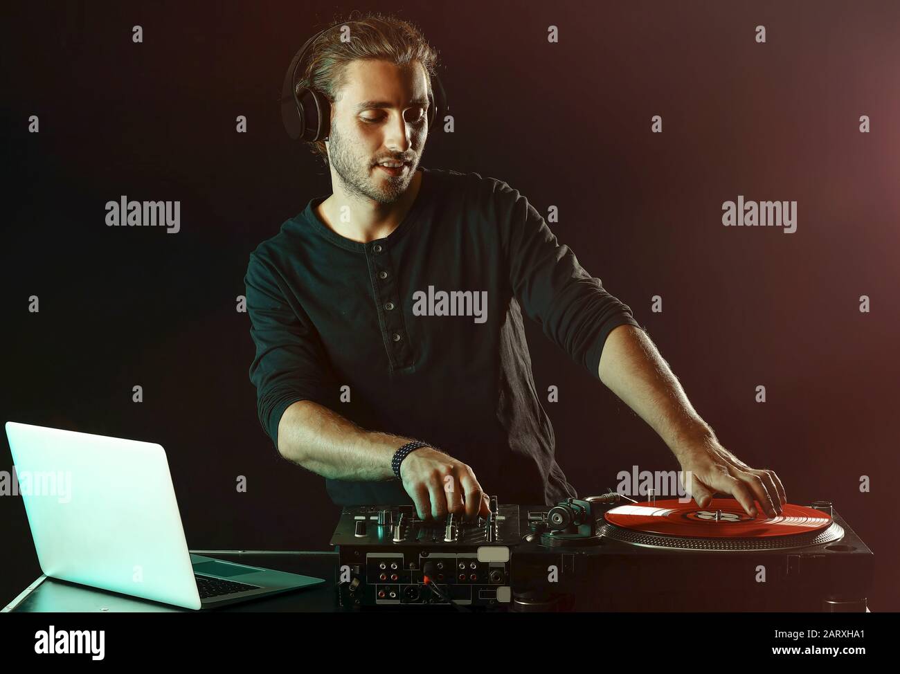 Black male dj playing hi-res stock photography and images - Alamy
