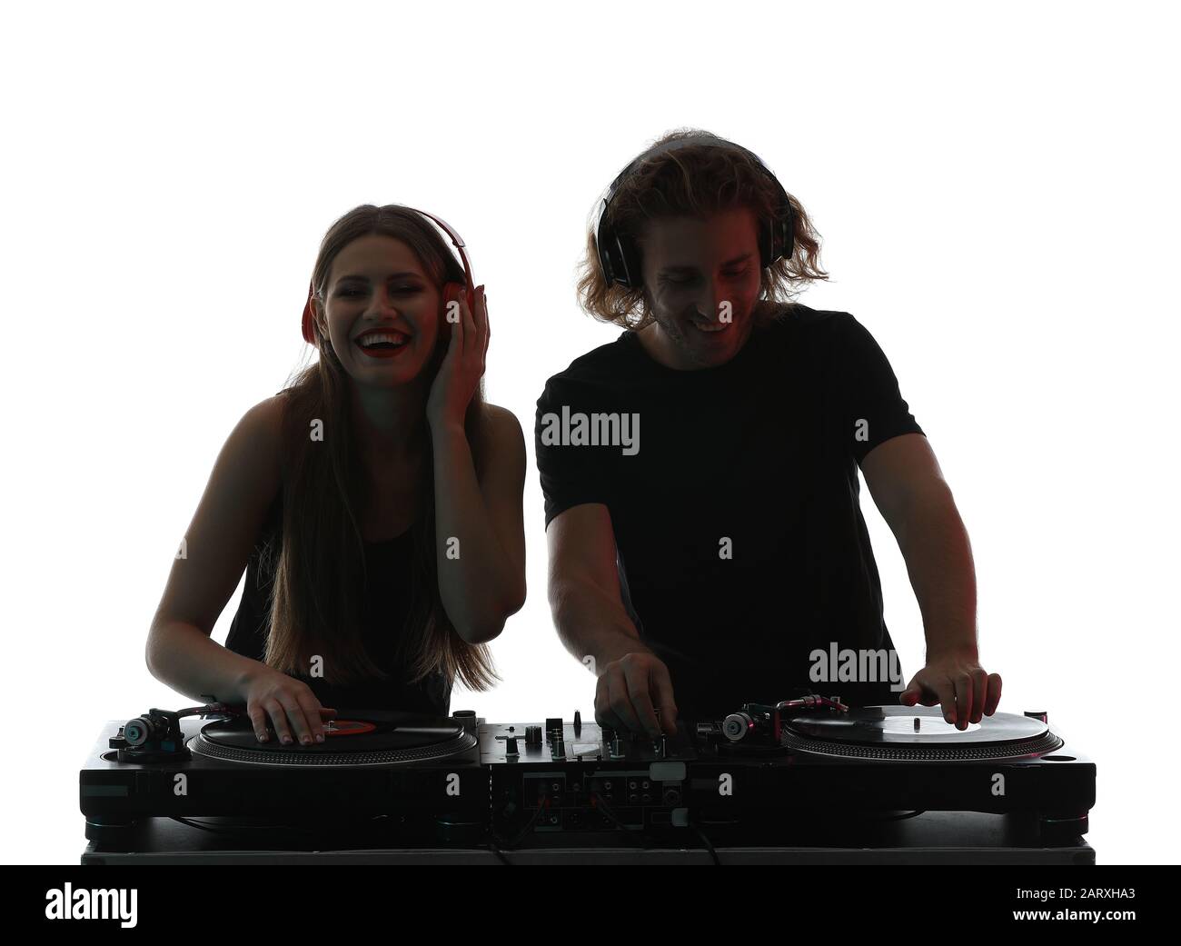 Silhouette of young djs playing music on white background Stock Photo ...