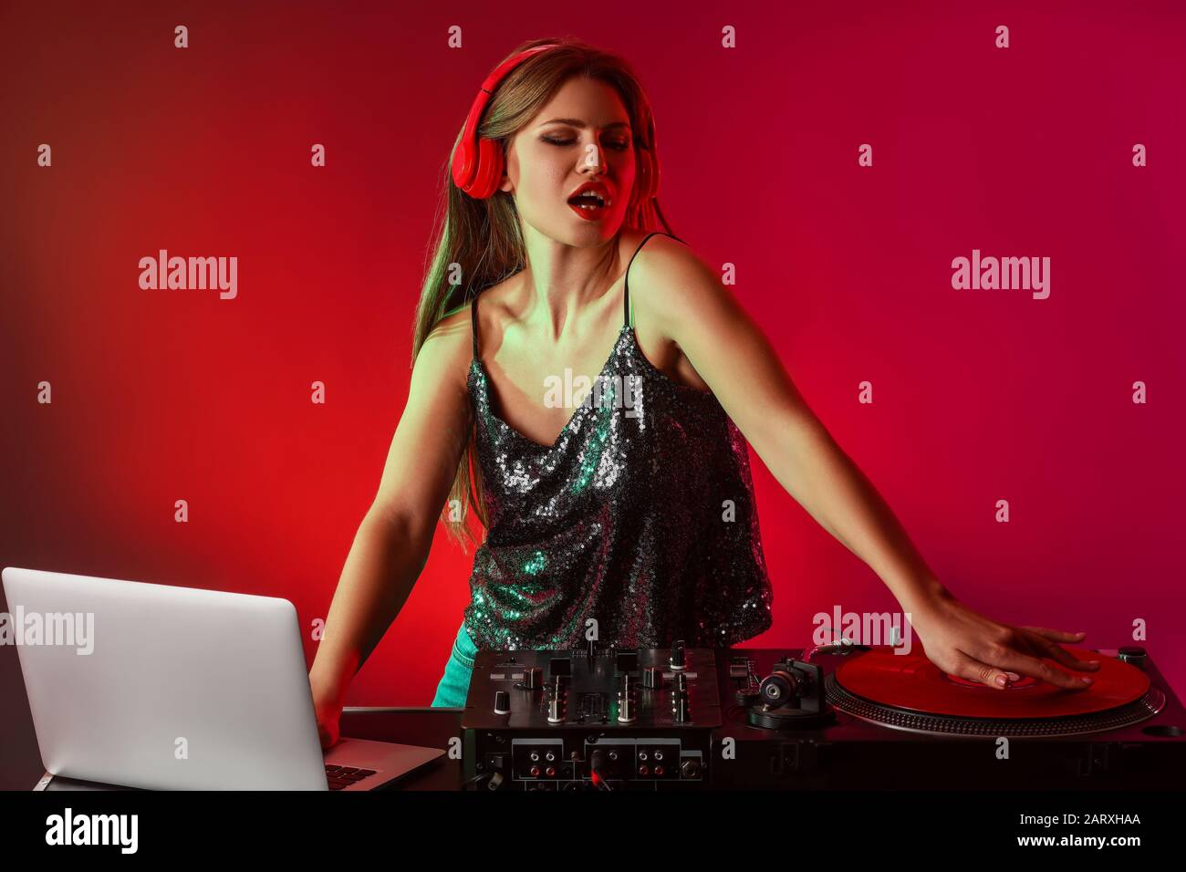 Female dj playing hi-res stock photography and images - Alamy