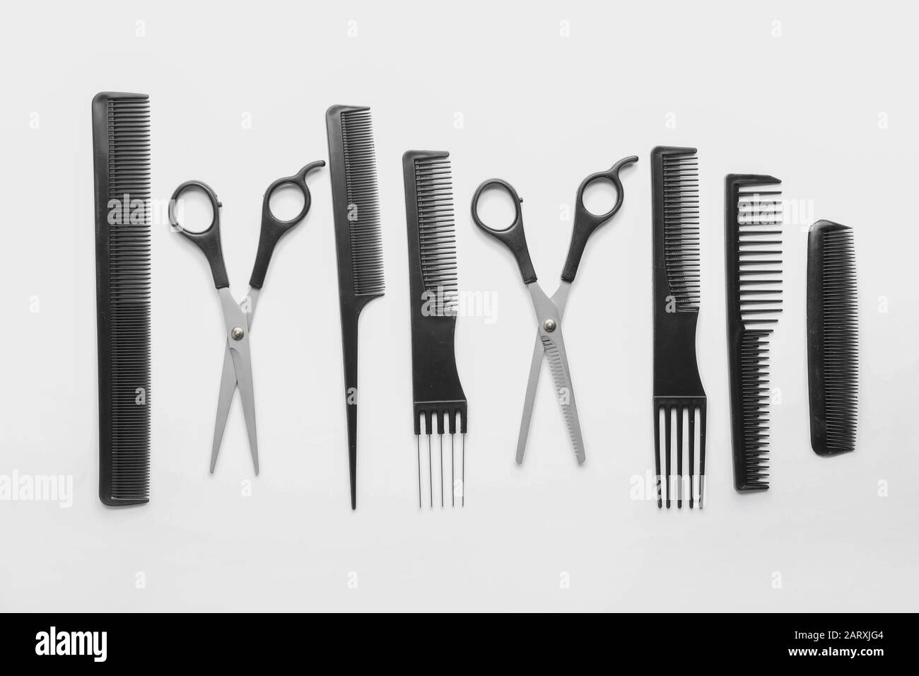 Professional hairdresser's set on white background Stock Photo - Alamy