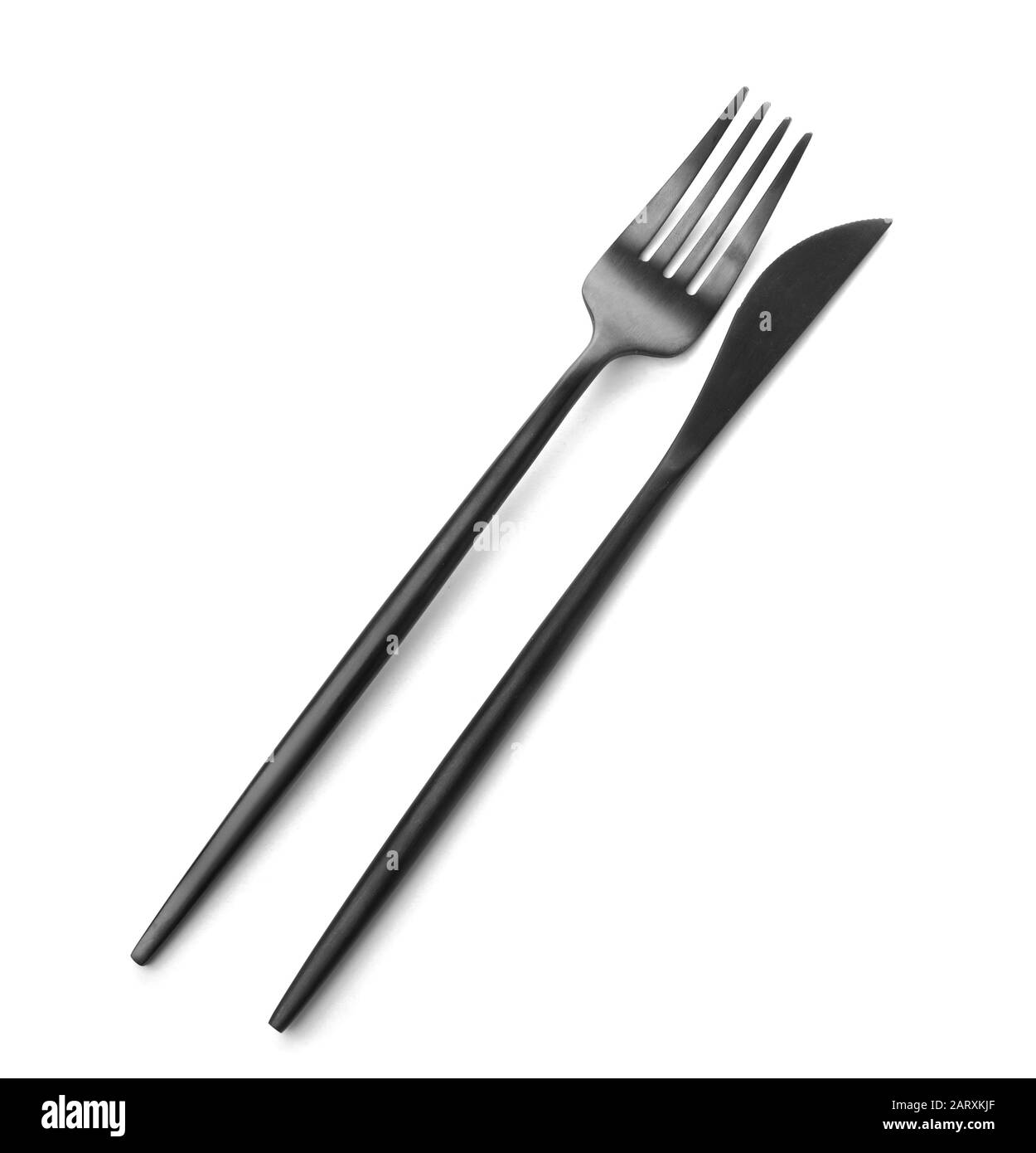 Clean cutlery on white background Stock Photo - Alamy