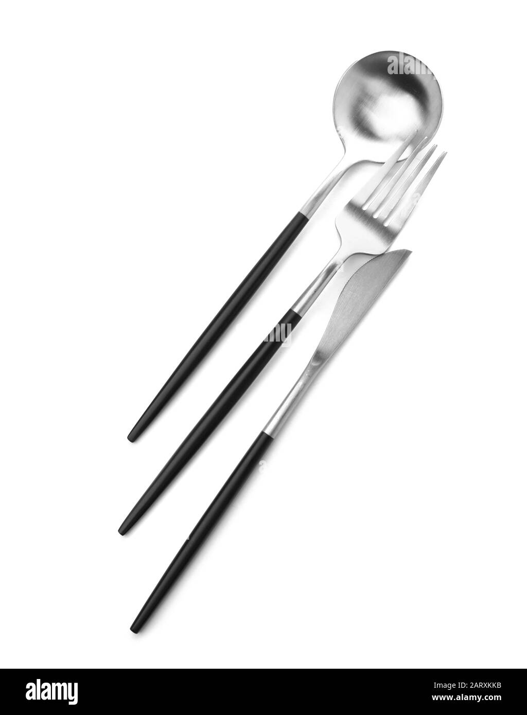 Clean cutlery on white background Stock Photo - Alamy