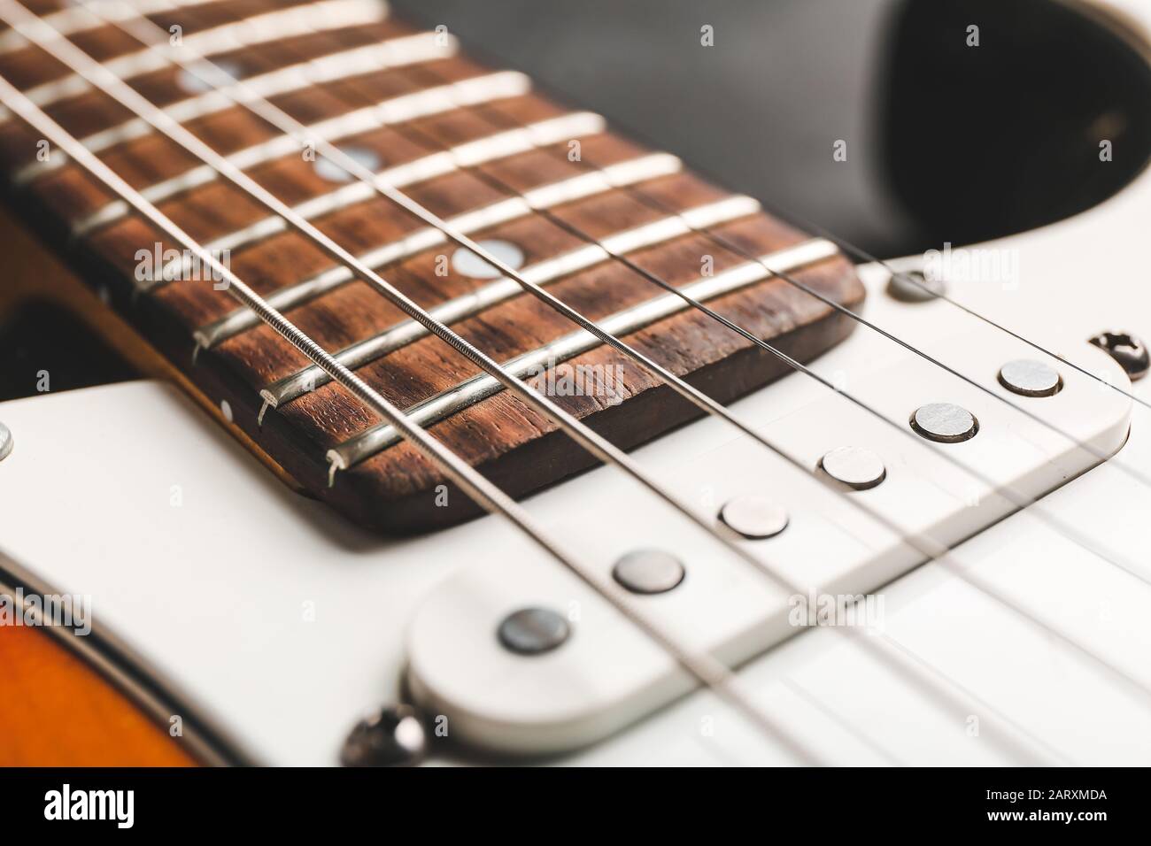 Modern bass guitar, closeup view Stock Photo - Alamy